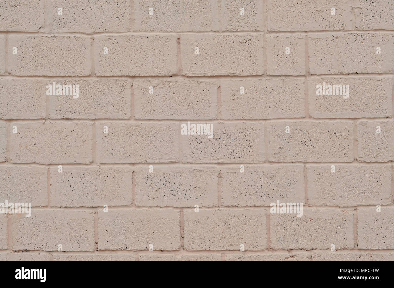 Weathered stained old colored beige block wall background. Texture of ...