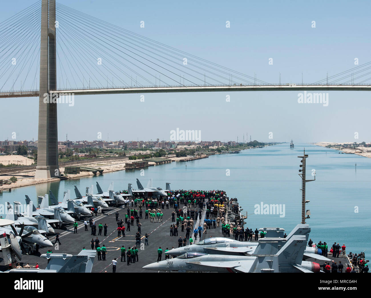 170605-N-RZ514-198 SUEZ CANAL (June 5, 2017) Sailors observe the Suez ...