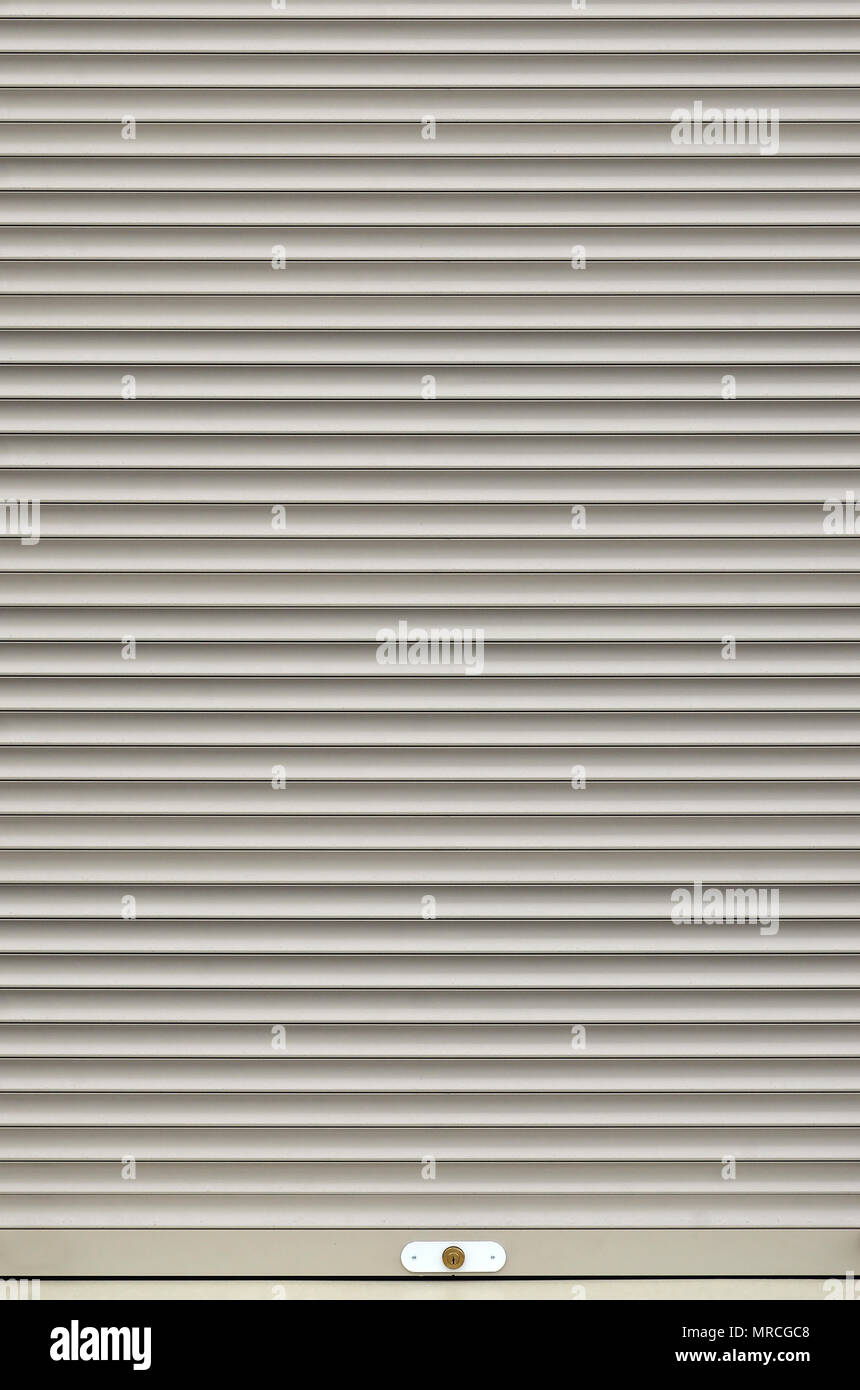 The texture of corrugated metal sheet, white or grey slide door. Old ...