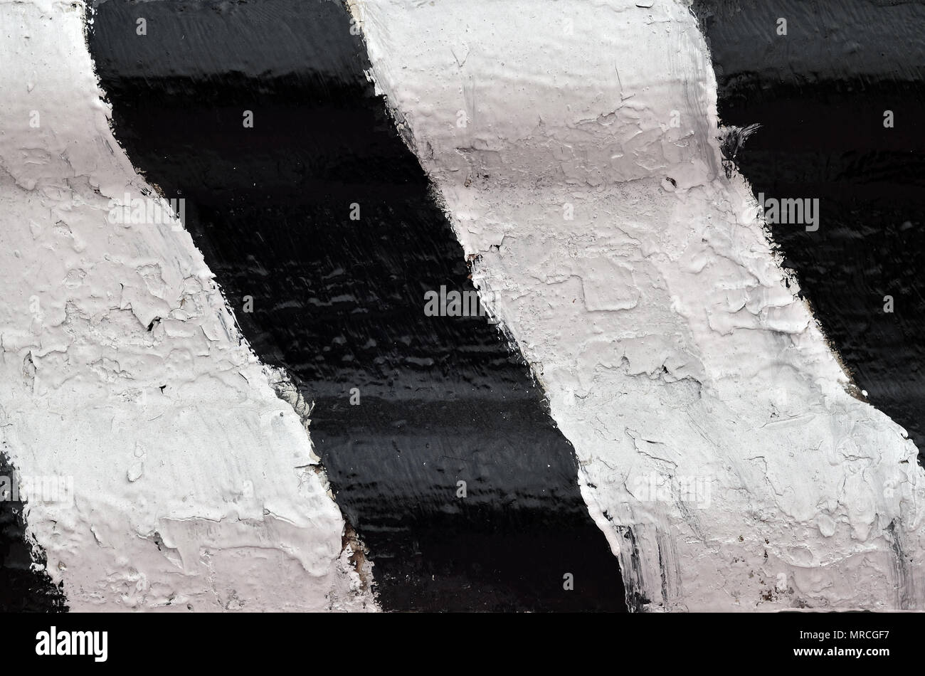 Close-up view of a metal barrier with striped color. An image of a ...