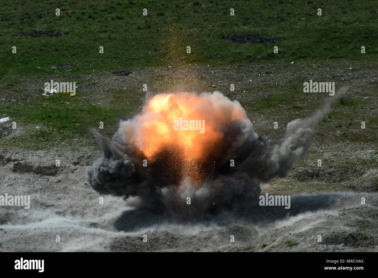 Expired ammunition is disposed of during a controlled detonation at ...