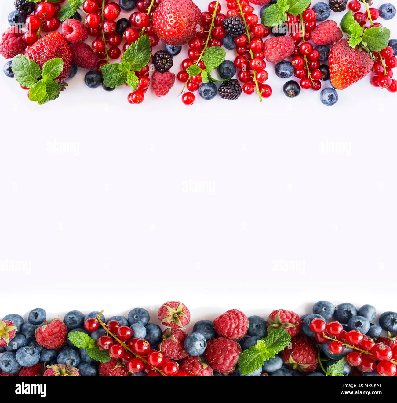 Black-blue and red fruits. Ripe red currants, strawberries, raspberries ...