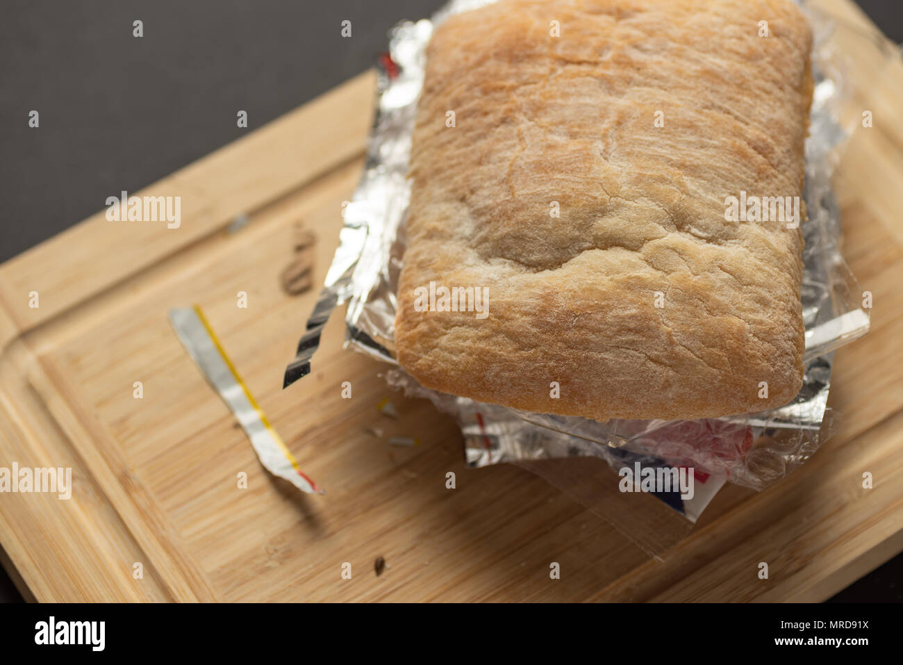 Fresh tasty panini sandwich with plastic waste and paper cardboard ...
