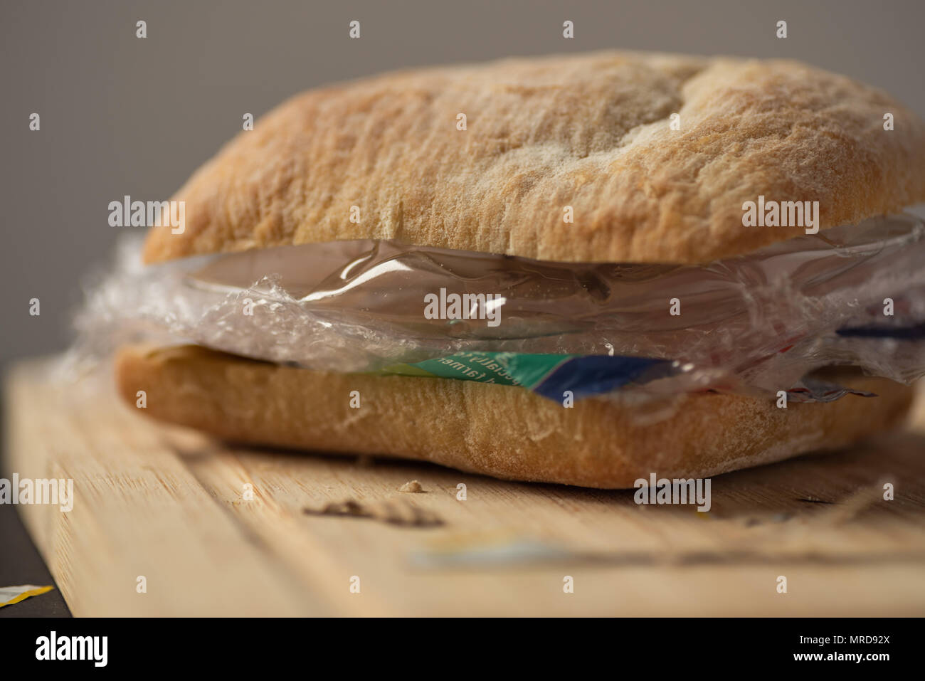 Fresh tasty panini sandwich with plastic waste and paper cardboard ...