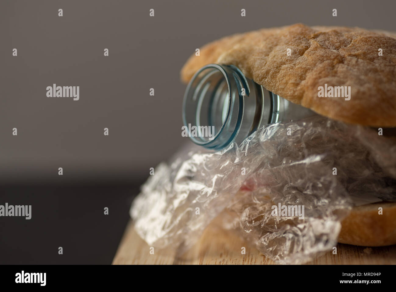 Fresh tasty panini sandwich with plastic waste and paper cardboard ...