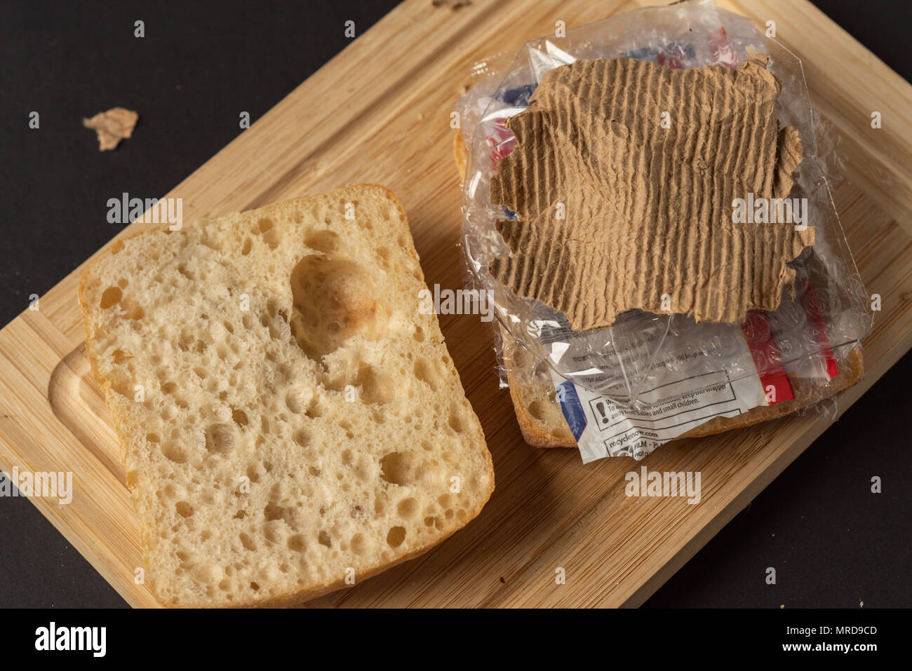 Fresh tasty panini sandwich with plastic waste and paper cardboard ...