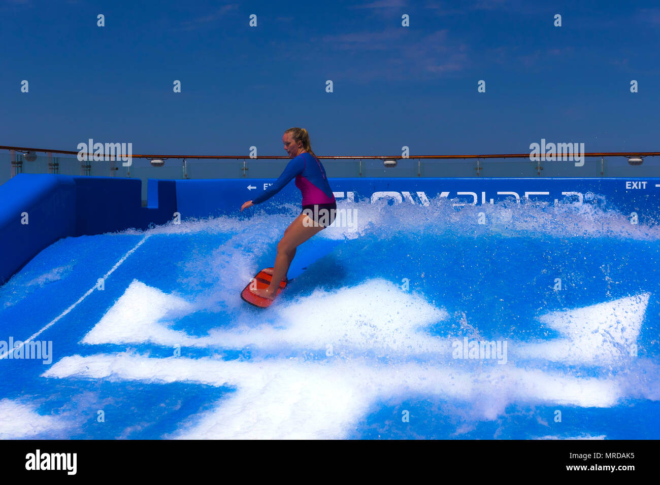 Cape Canaveral, USA - APRIL 29, 2018: Man surfing on the FlowRider ...
