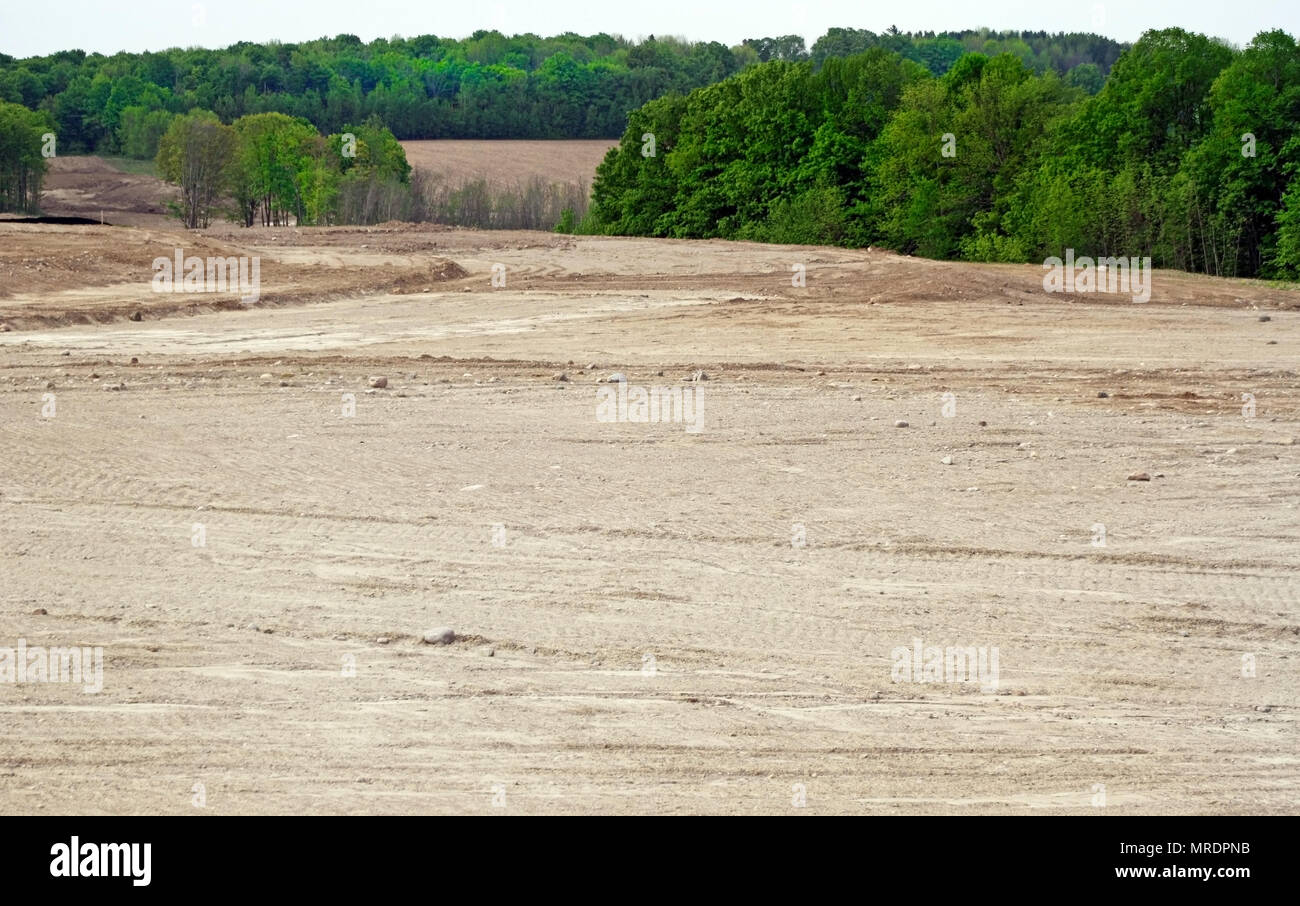 Deforestation of trees and acres of land leveled and graded to make way ...