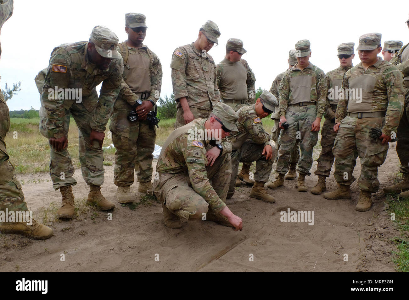Battle Group Poland U.S. combat engineer Sgt. Ethan Pratt shows his ...