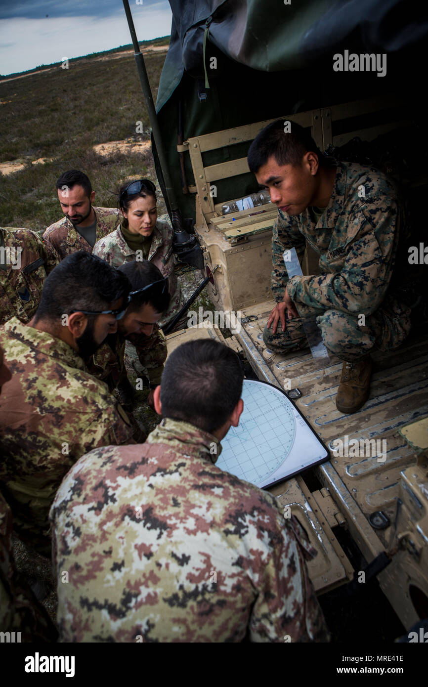 U.S. Marines with Black Sea Rotational Force 17.1 show members of the ...