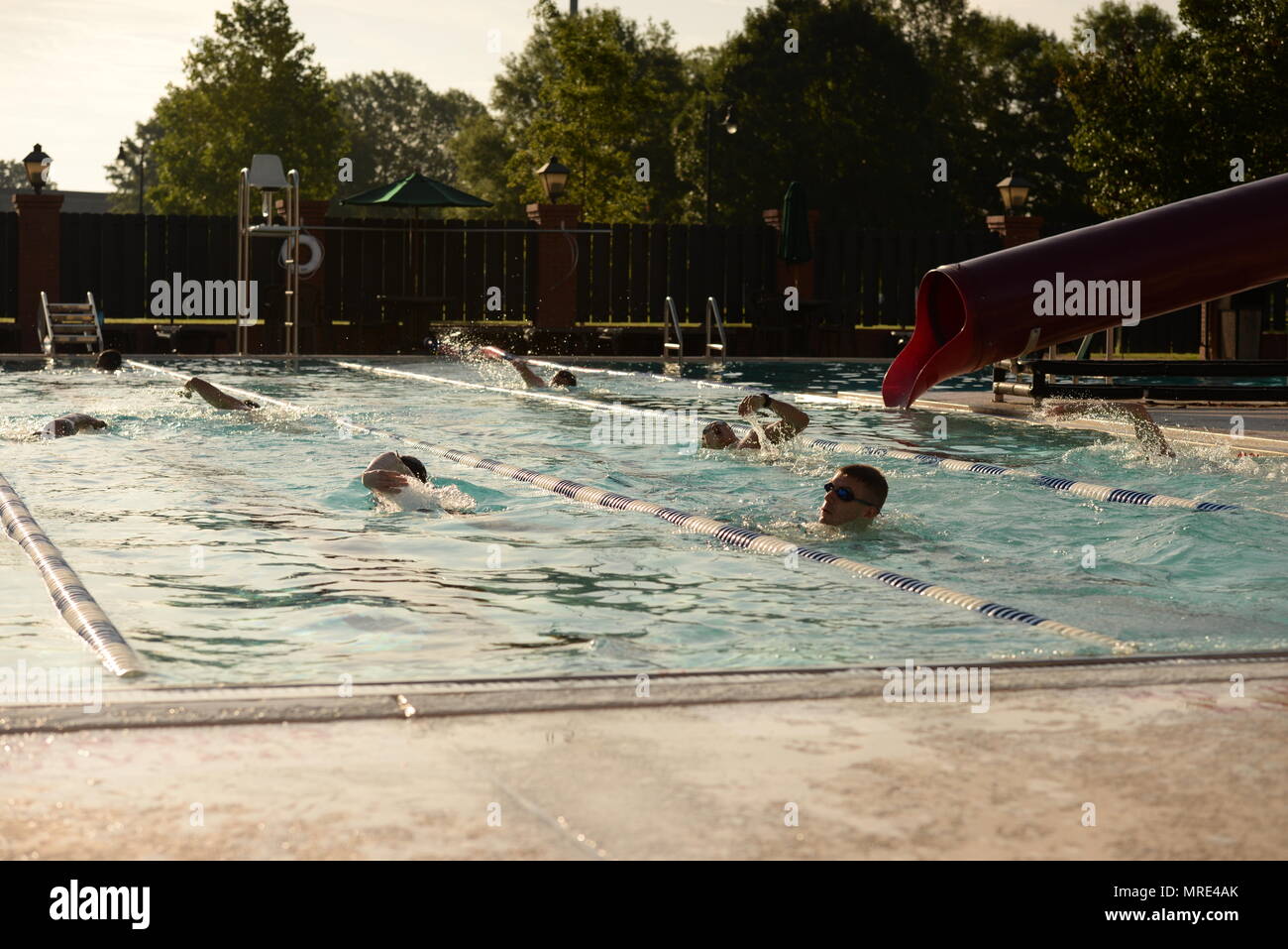 Athletes swim in a base triathlon June 3, 2017, in the Independence ...