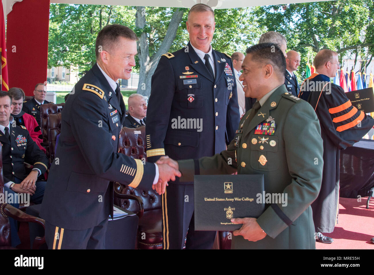 Col. Romeo S. Brawner of the Philippines accepts his Army War College ...