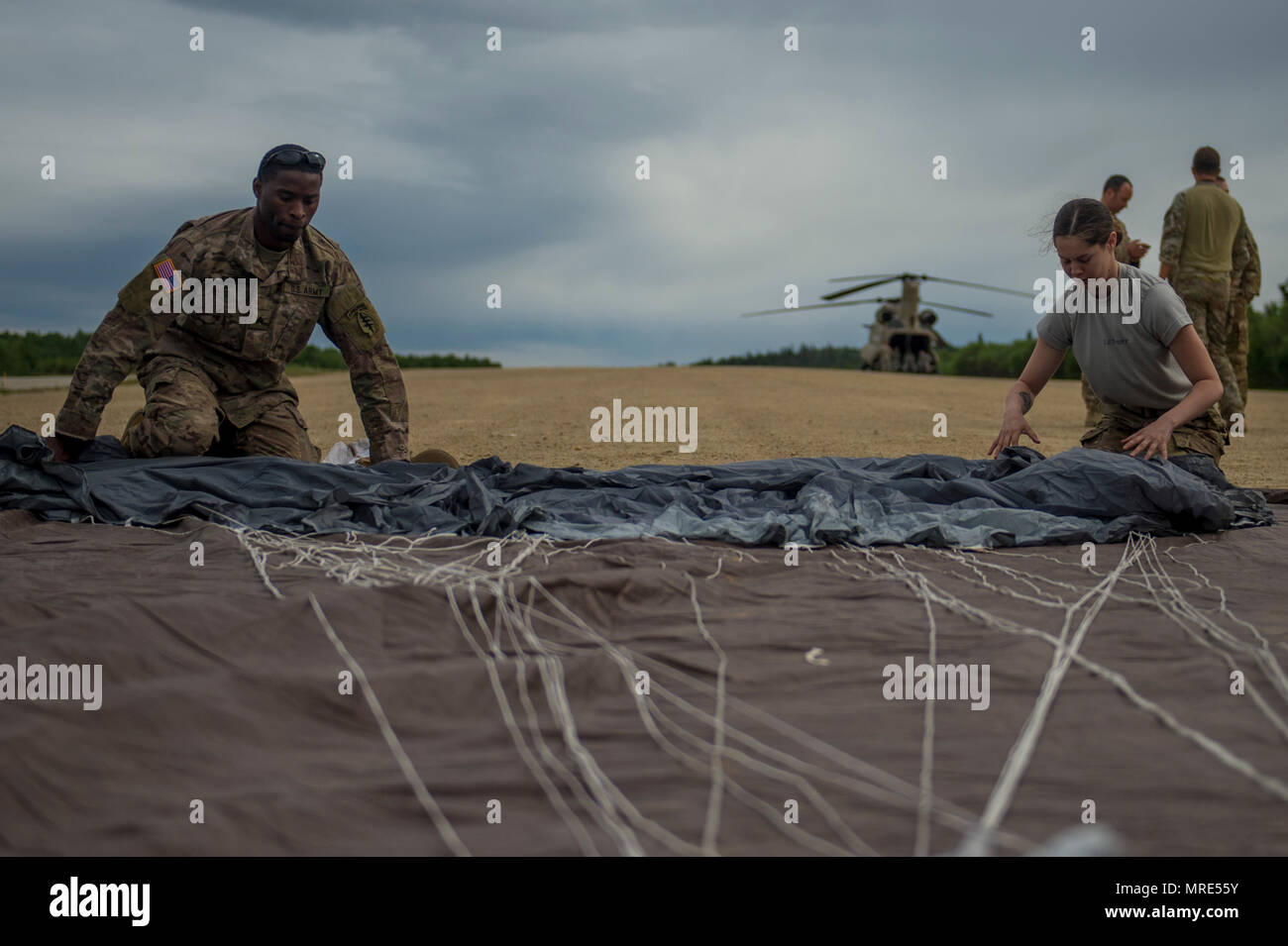 U.S. Army Sergeant Arthur Sneed and Private 1st Class Azalea Tashoff ...