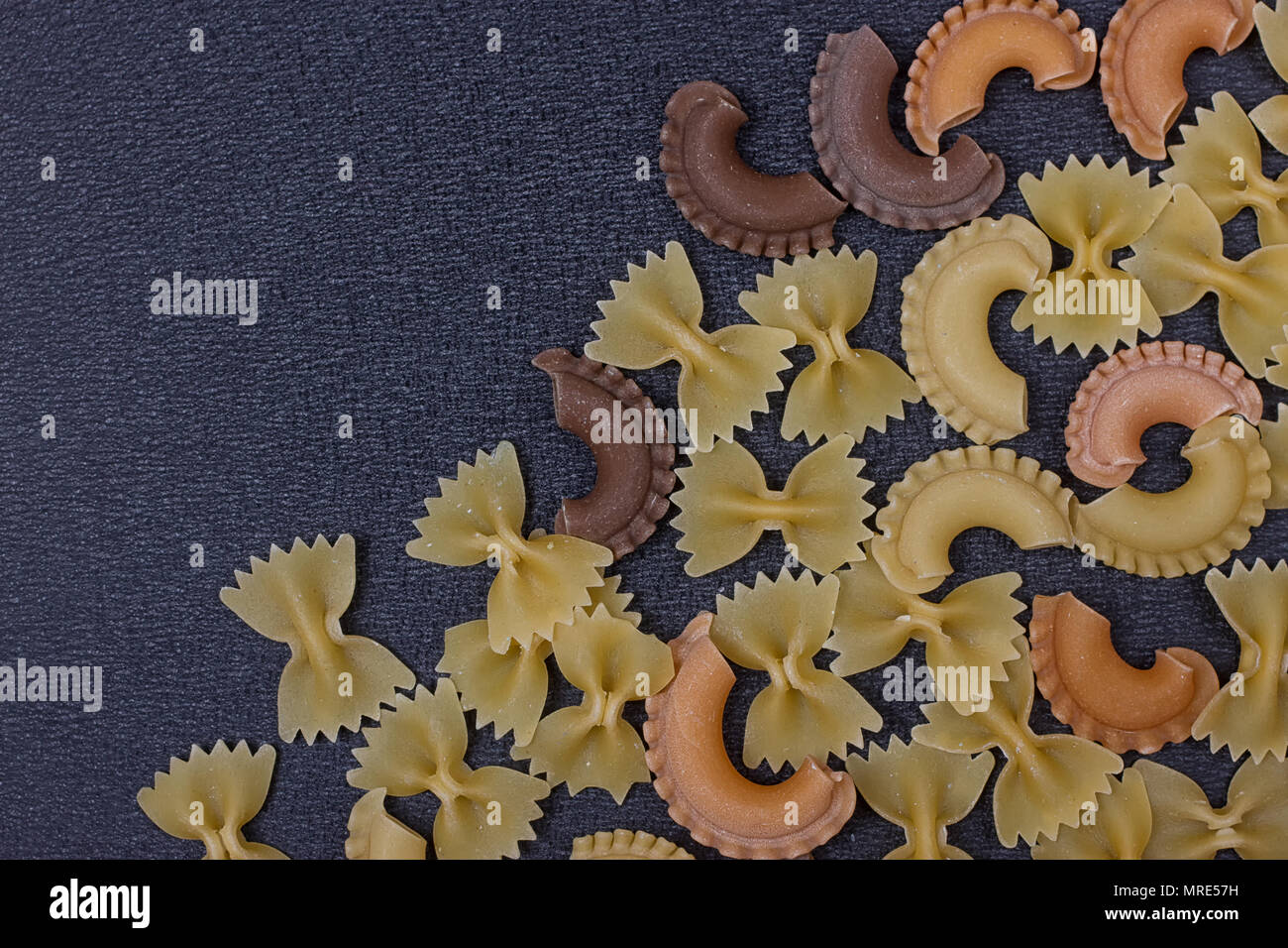 Variety of types of Italian pasta background. Set of raw dry pasta on a ...