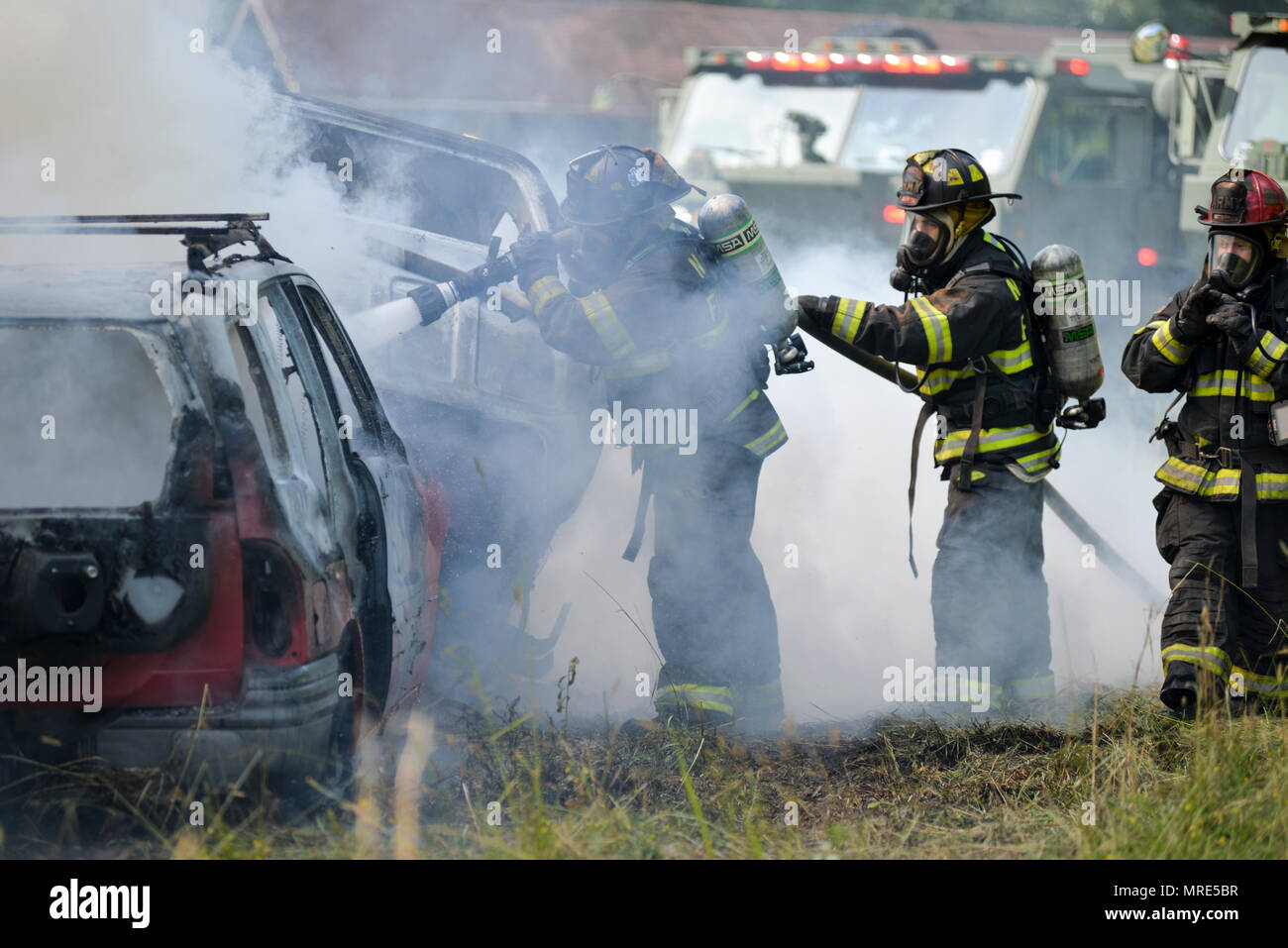 North Carolina National Guard and Air Guard firefighters extinguish a ...