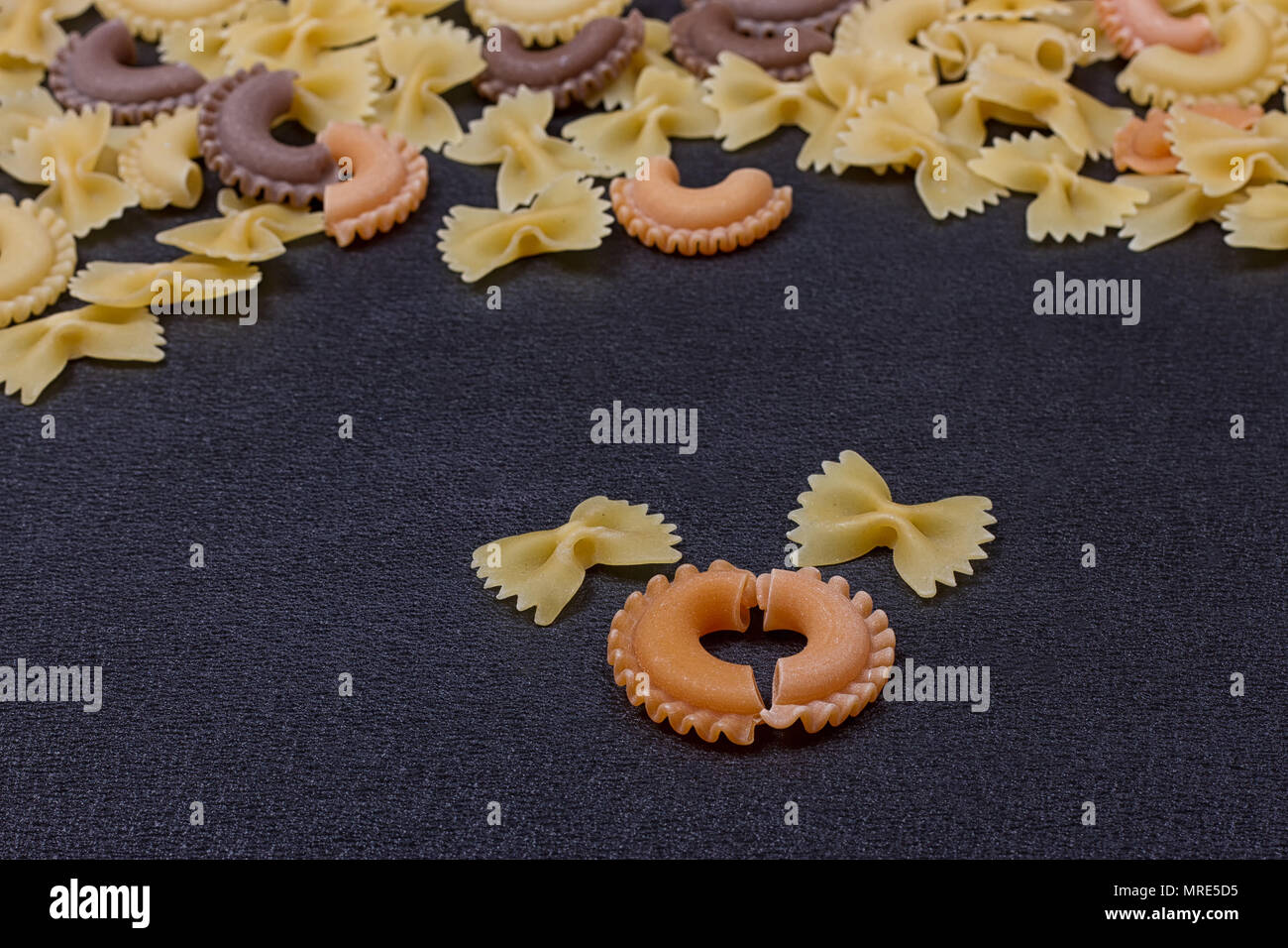 Variety of types of Italian pasta background. Set of raw dry pasta on a ...