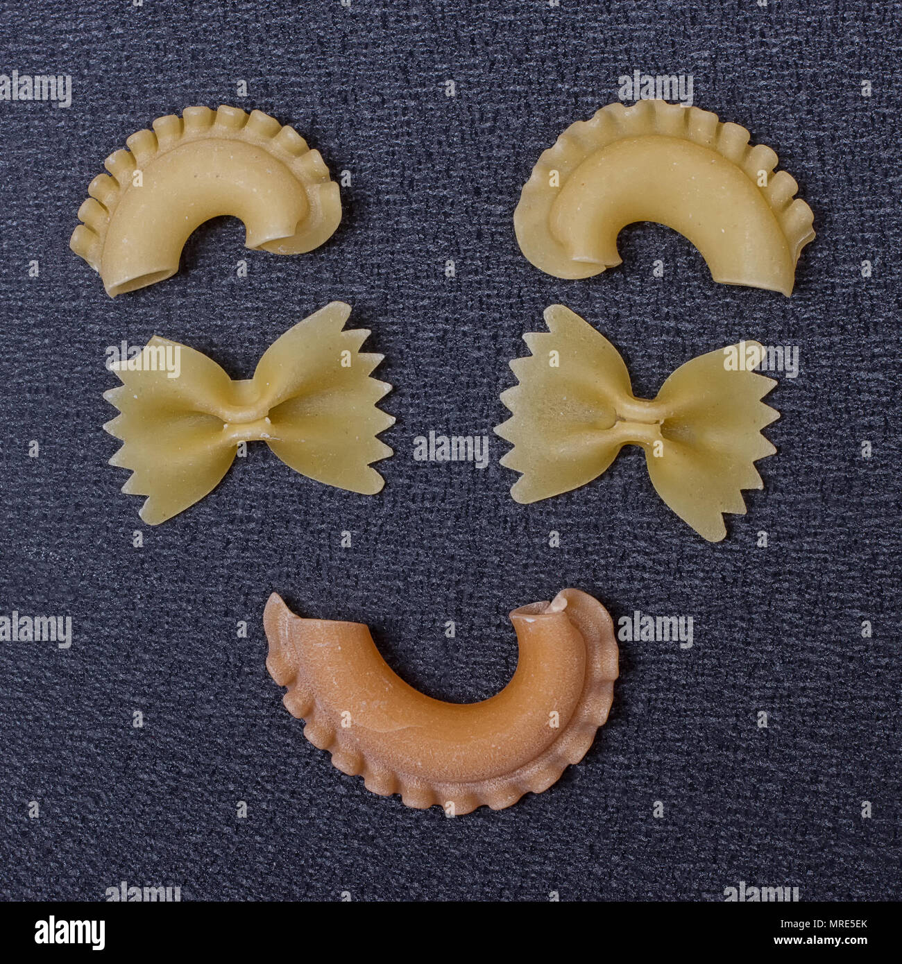 Smiley face raw pasta hi-res stock photography and images - Alamy