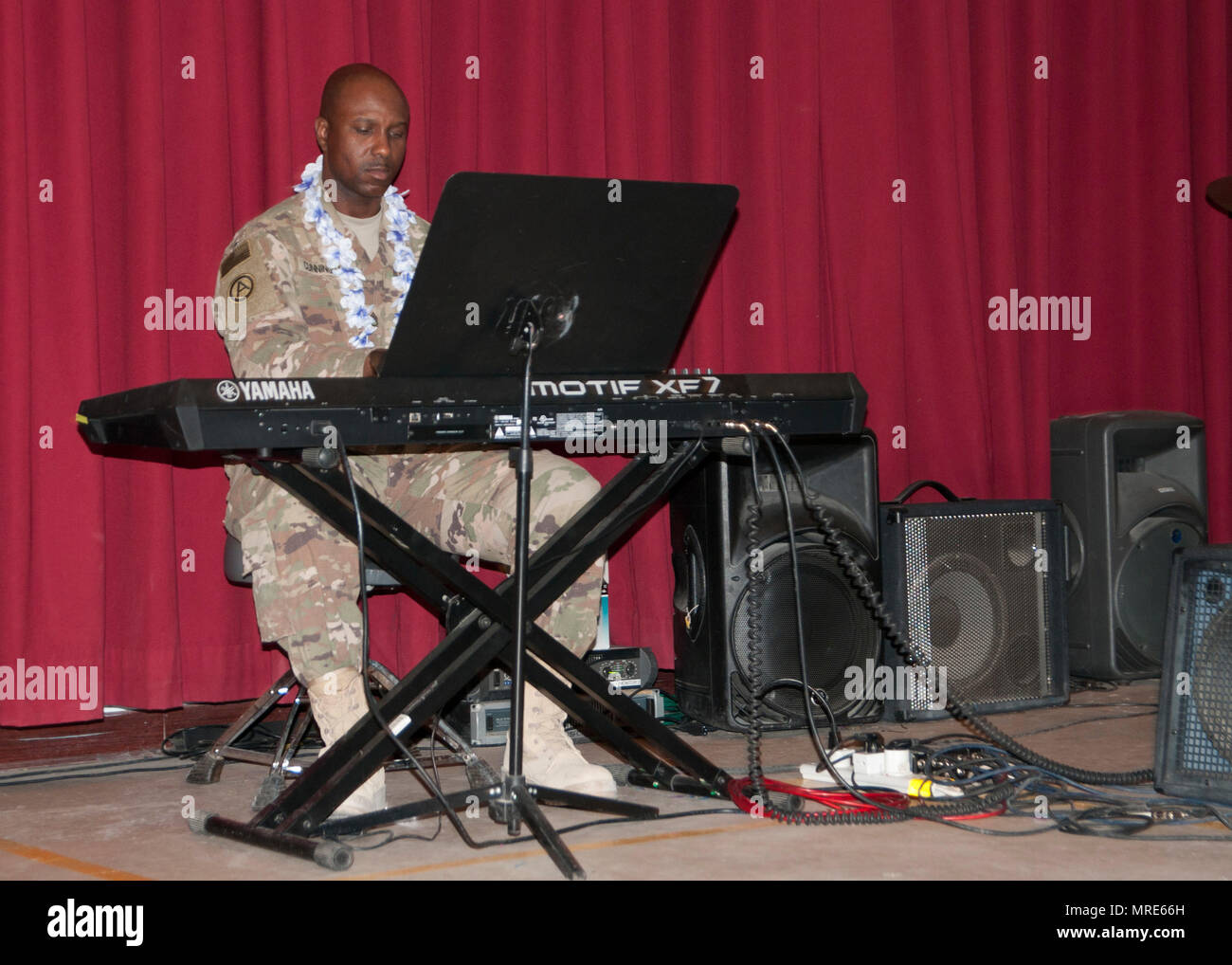 Sgt. 1st Class David Cunningham, 369th Sustainment Brigade, plays the ...
