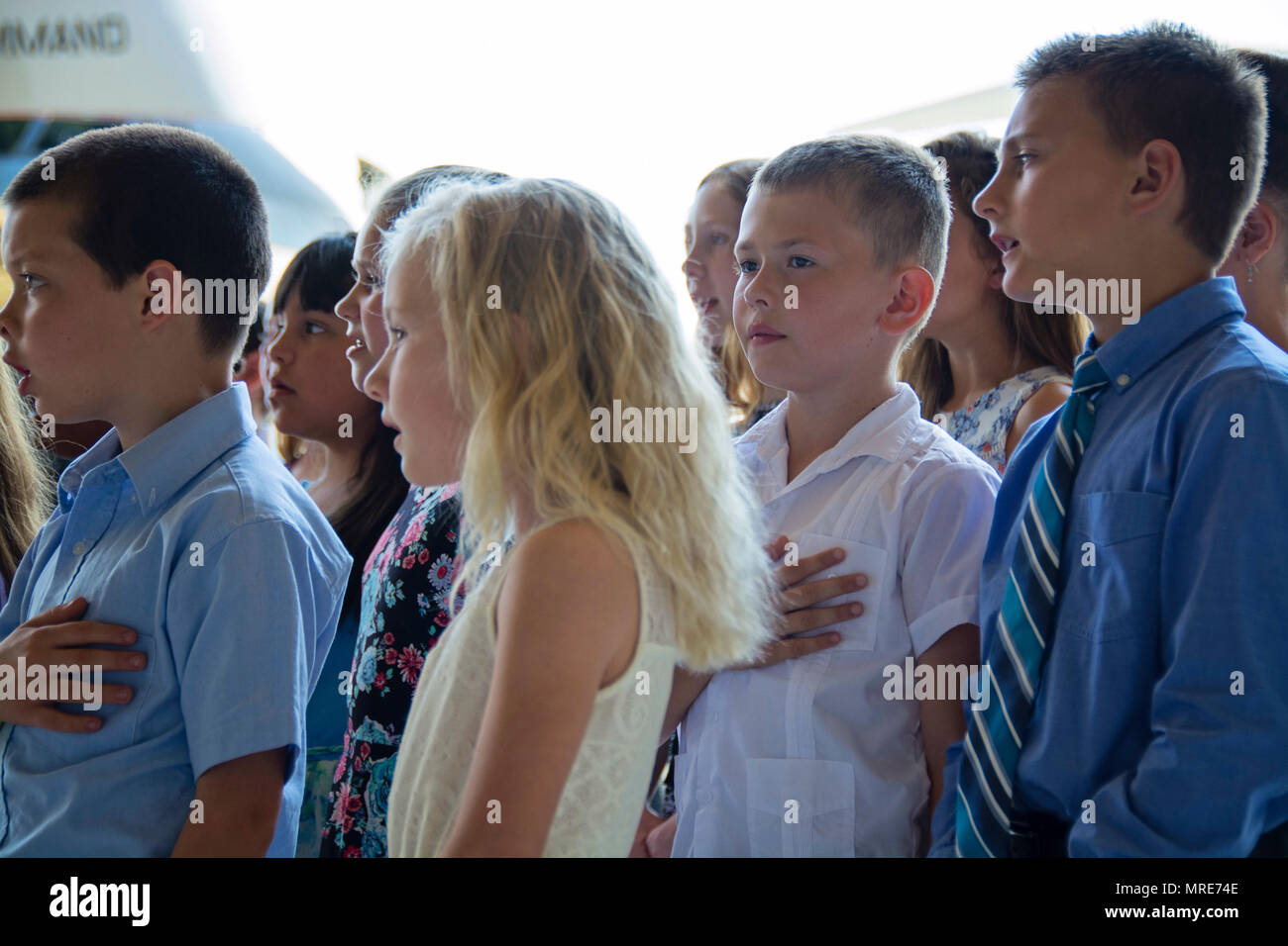 Children from the Major George S. Welch Elementary School chorous sing ...