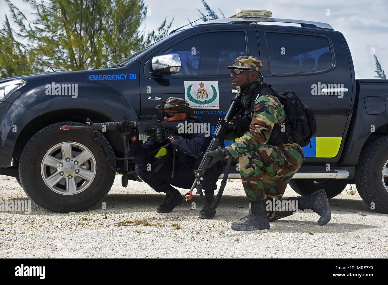 A Barbadian police officer and a member of the Barbadian Defence Force ...