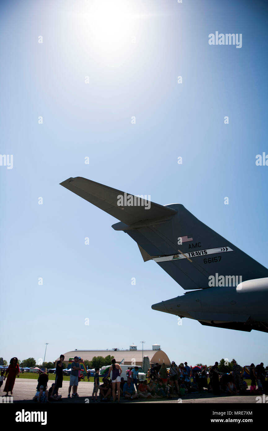 Attendees seek shade at Scott Air Force Base, Ill., June 9, 2017. The ...