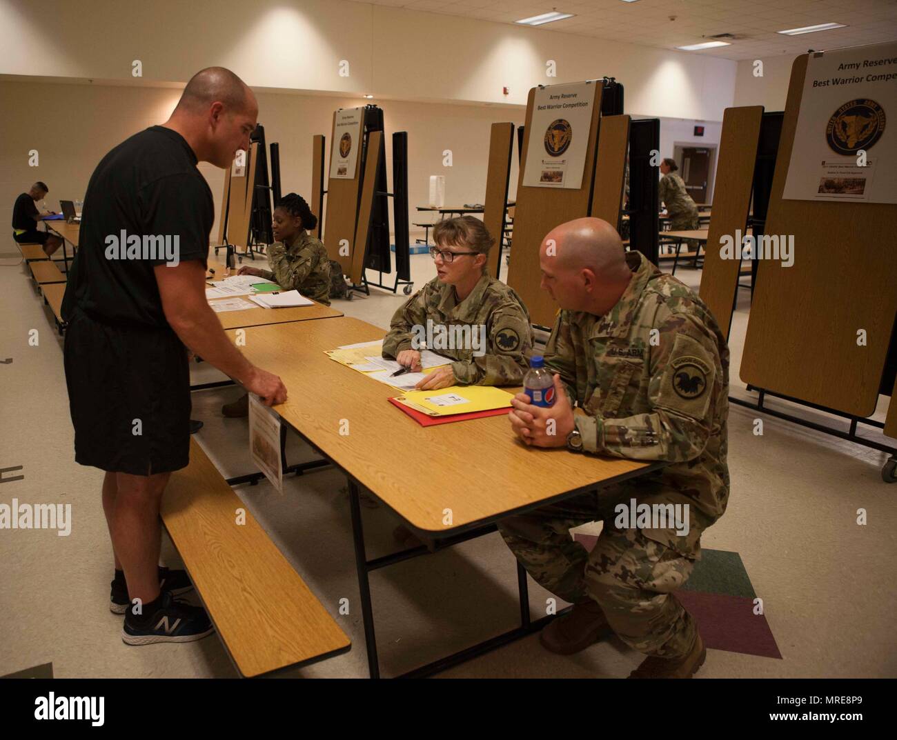 U.S. Army Sgt. David Blalock, of the 75th Training Command, left ...