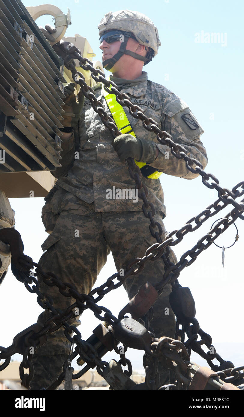 Spc. Caleb Grady, an armor crewman with 2d Battalion, 137th Infantry ...