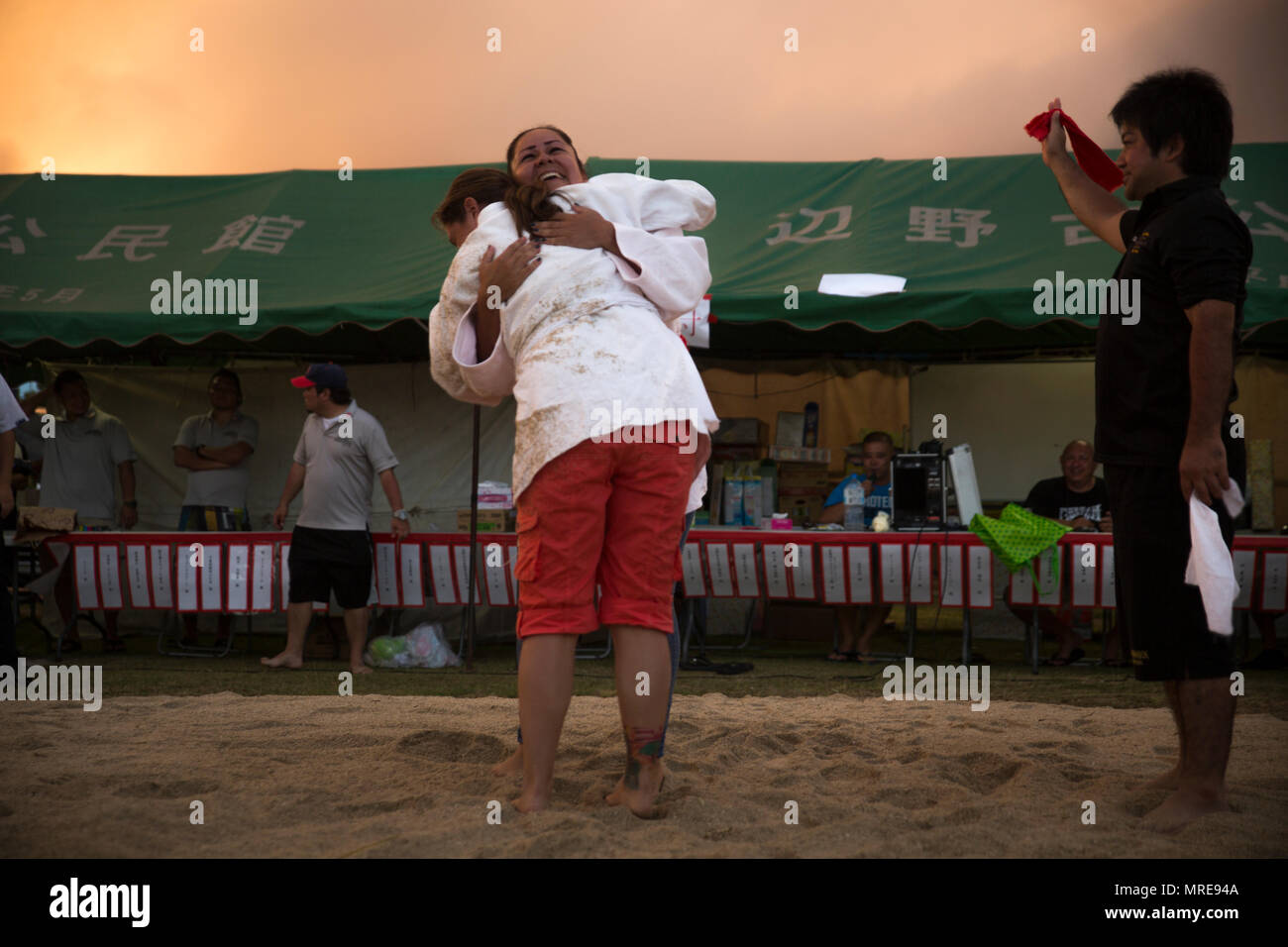 Two competitors embrace each other after their bout, June 10, 2017 ...