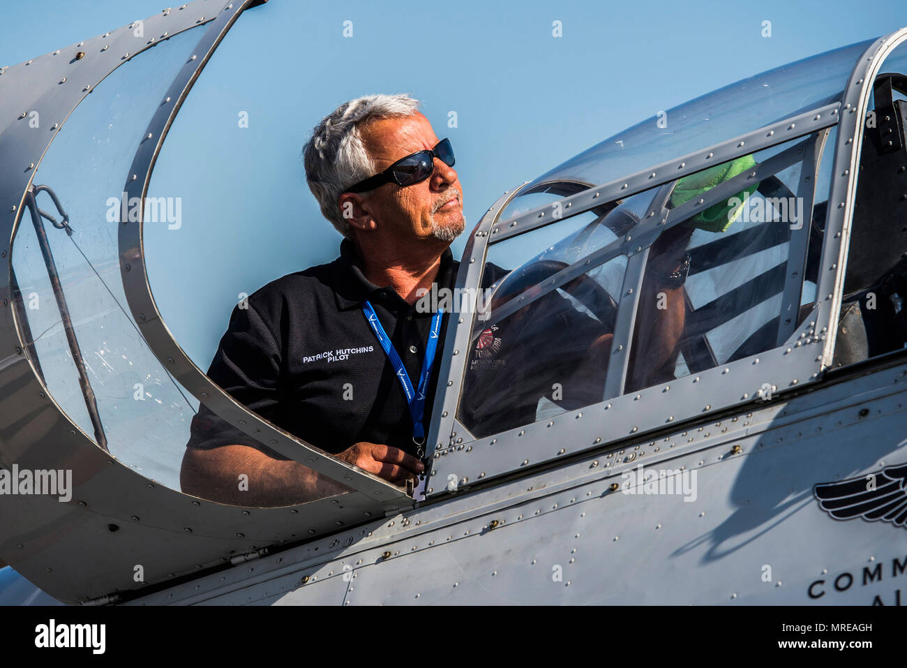 Pilots prepare their planes before the gates open for the Scott Air ...