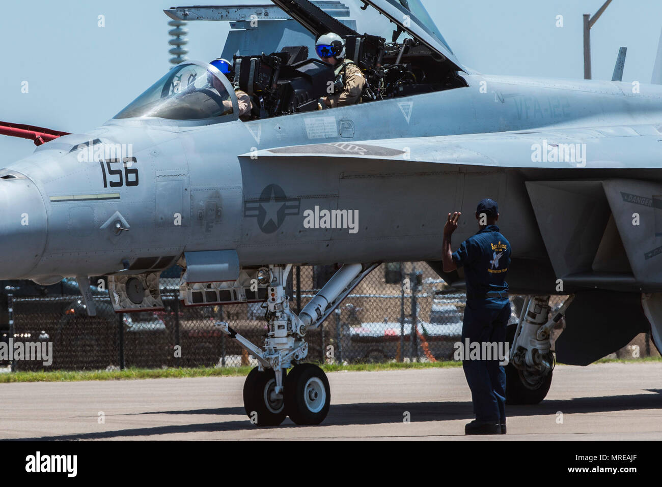 Members of the U.S. Navy Tactical Demonstration Team check the outer ...