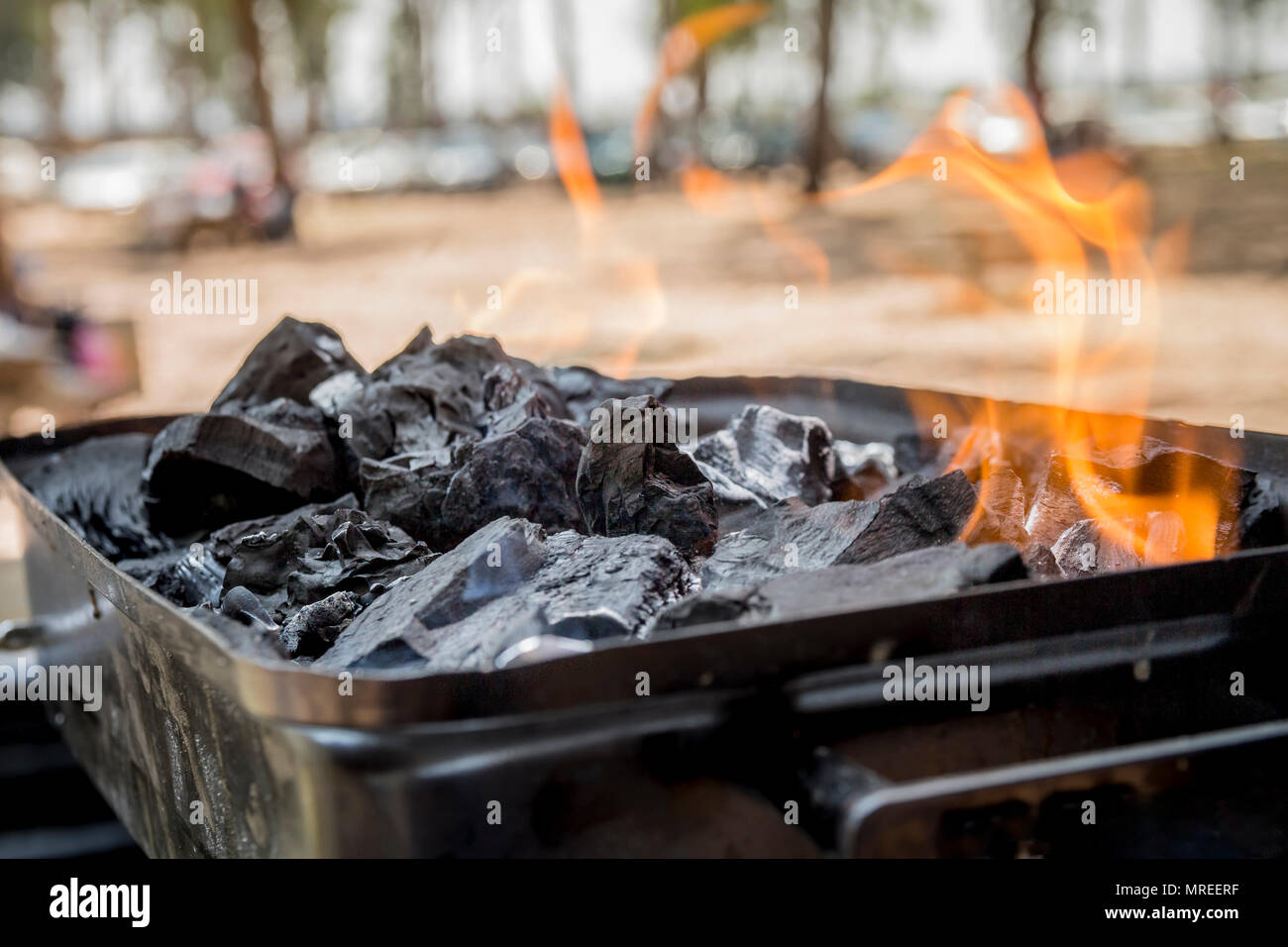 Coals are burned in a BBQ grill Stock Photo - Alamy