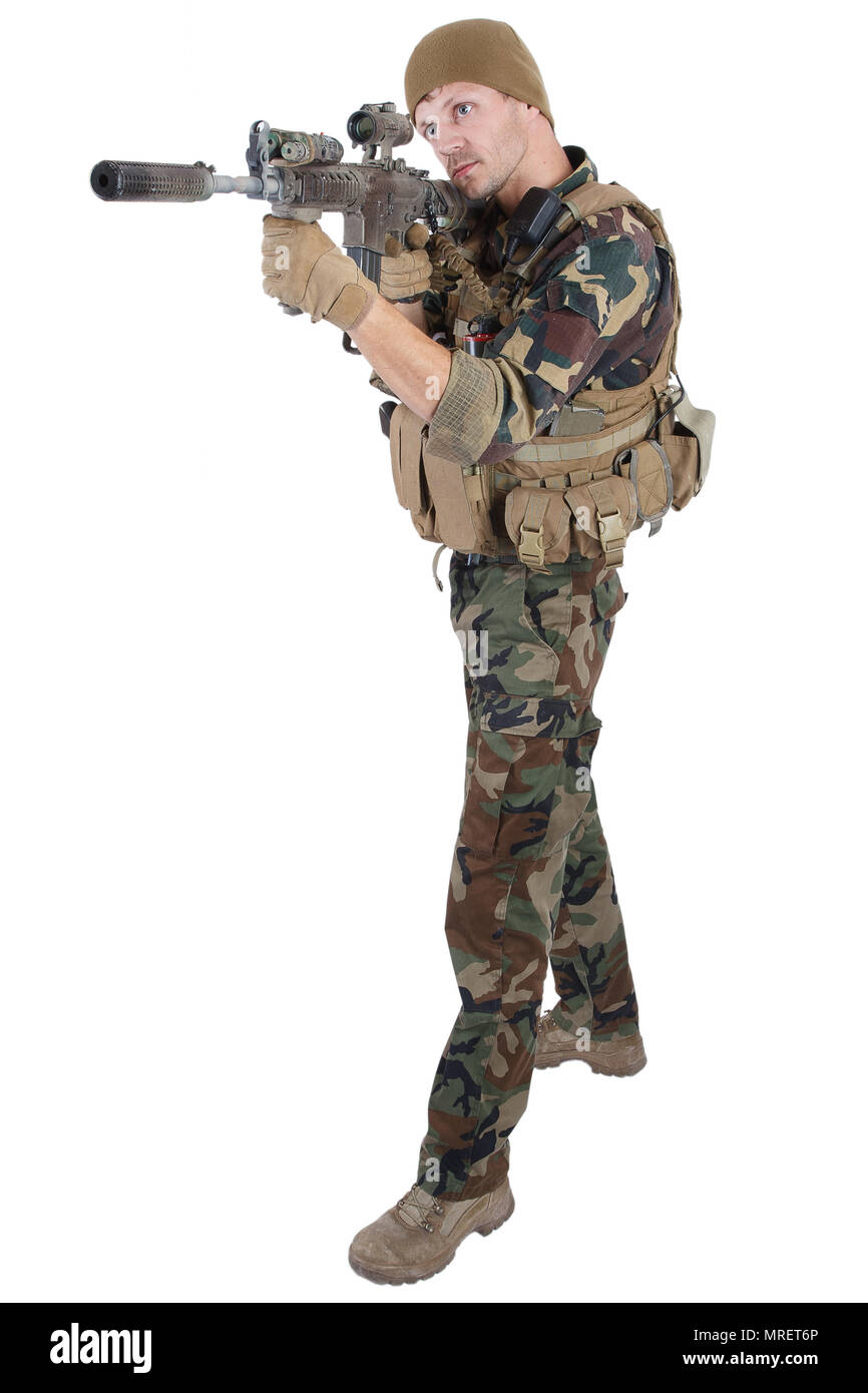 Private Military Company operator with assault rifle on white ...