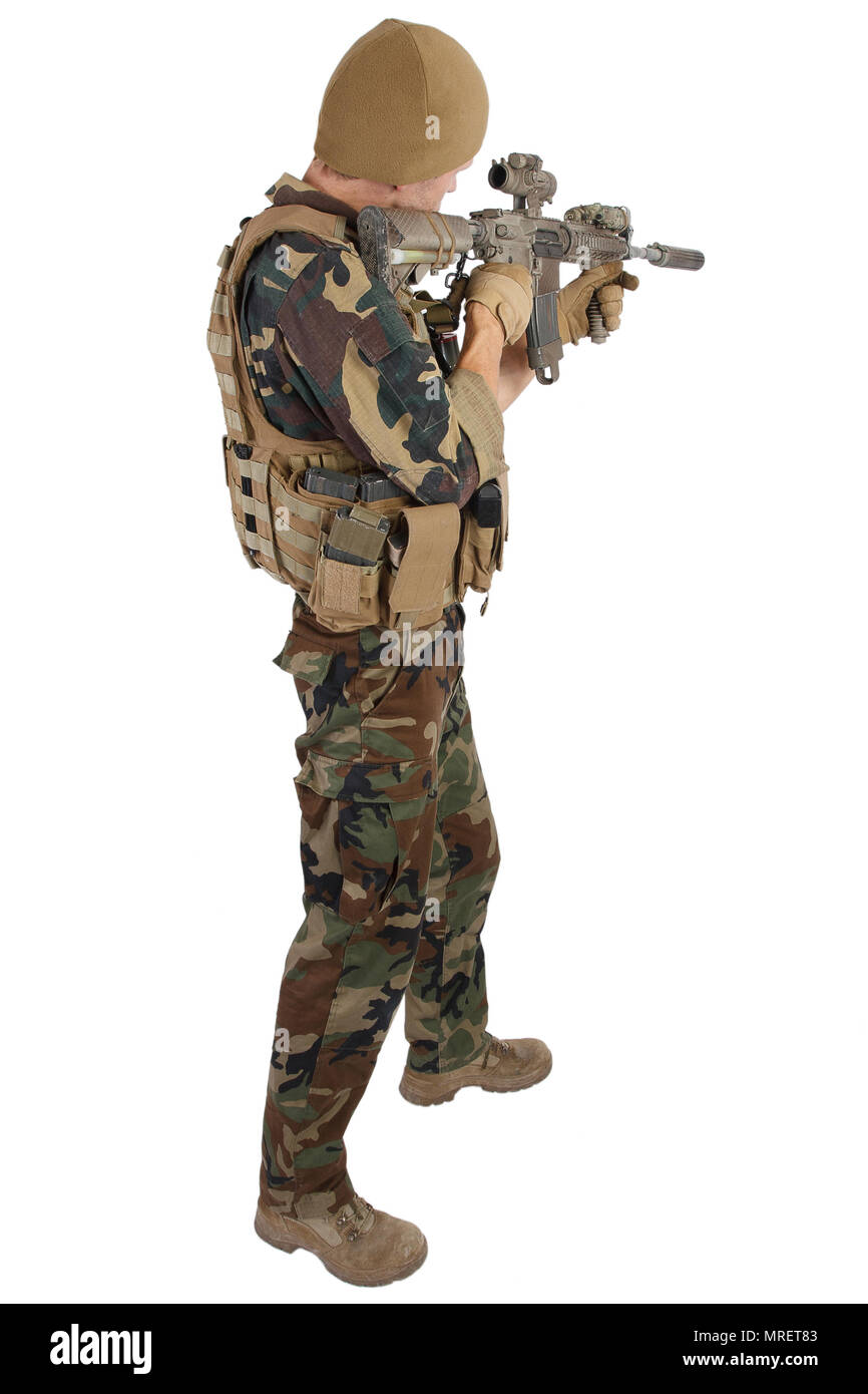 Private Military Company operator with assault rifle on white ...