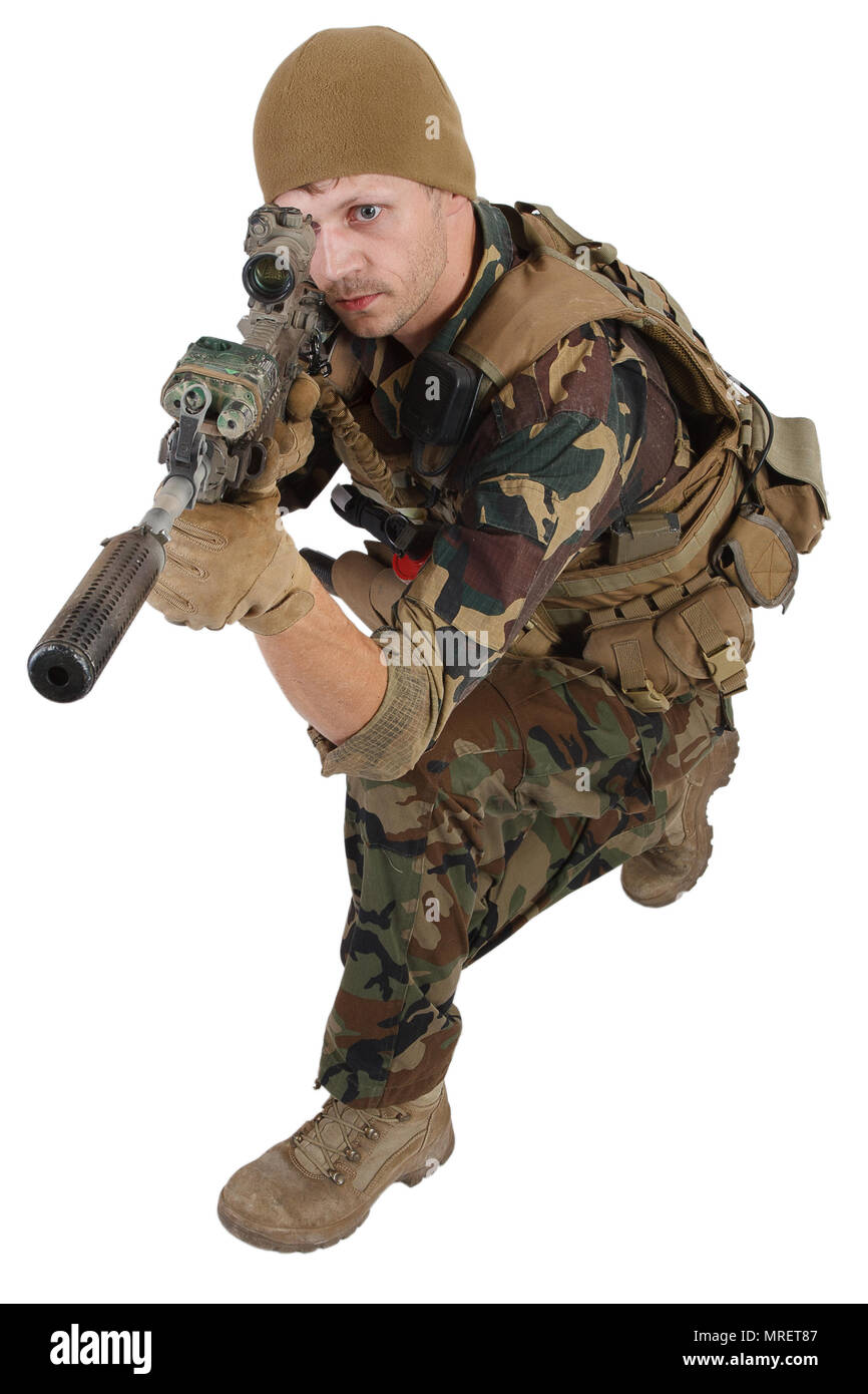 Private Military Company operator with assault rifle on white ...