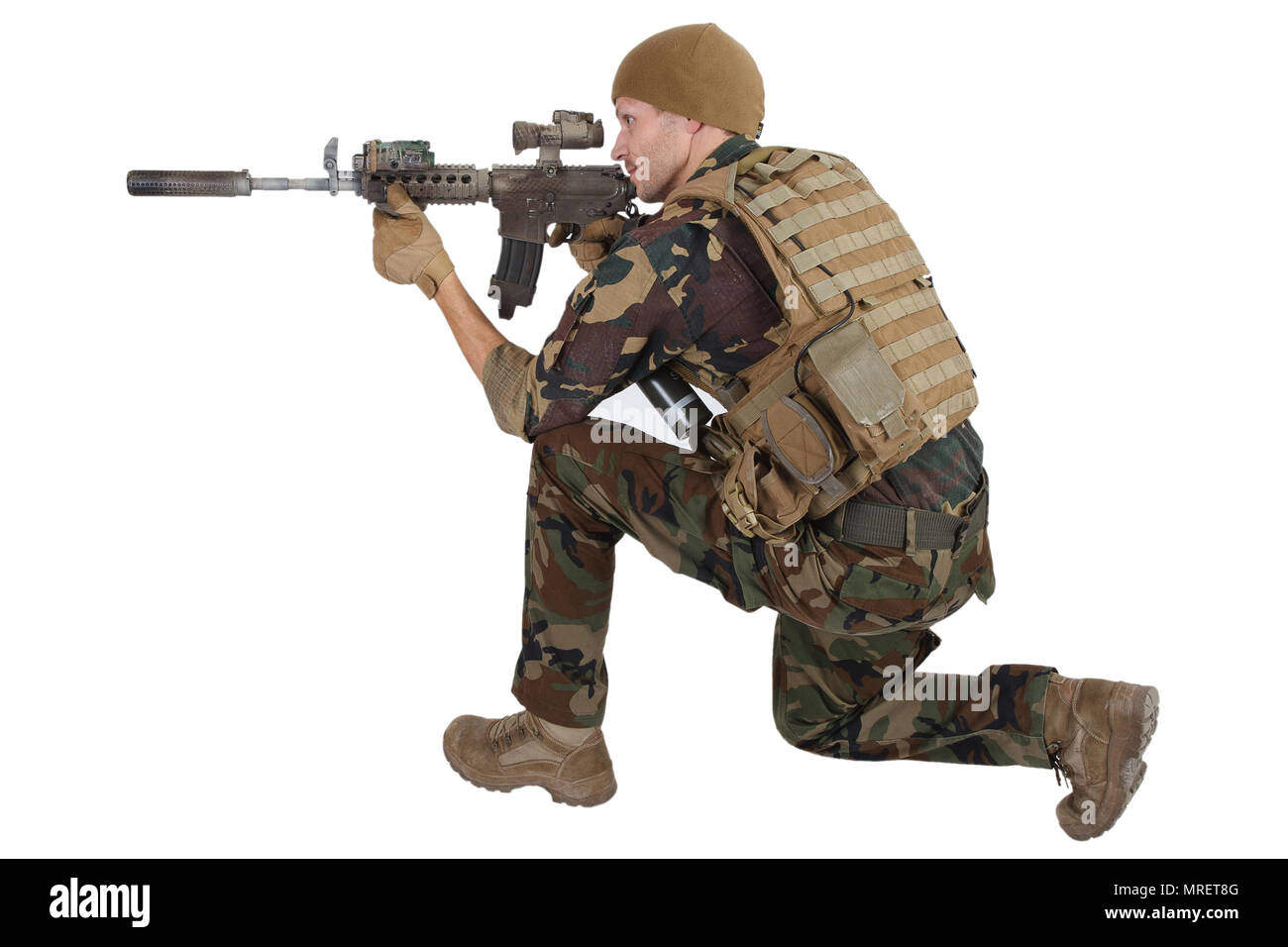 Private Military Company operator with assault rifle on white ...