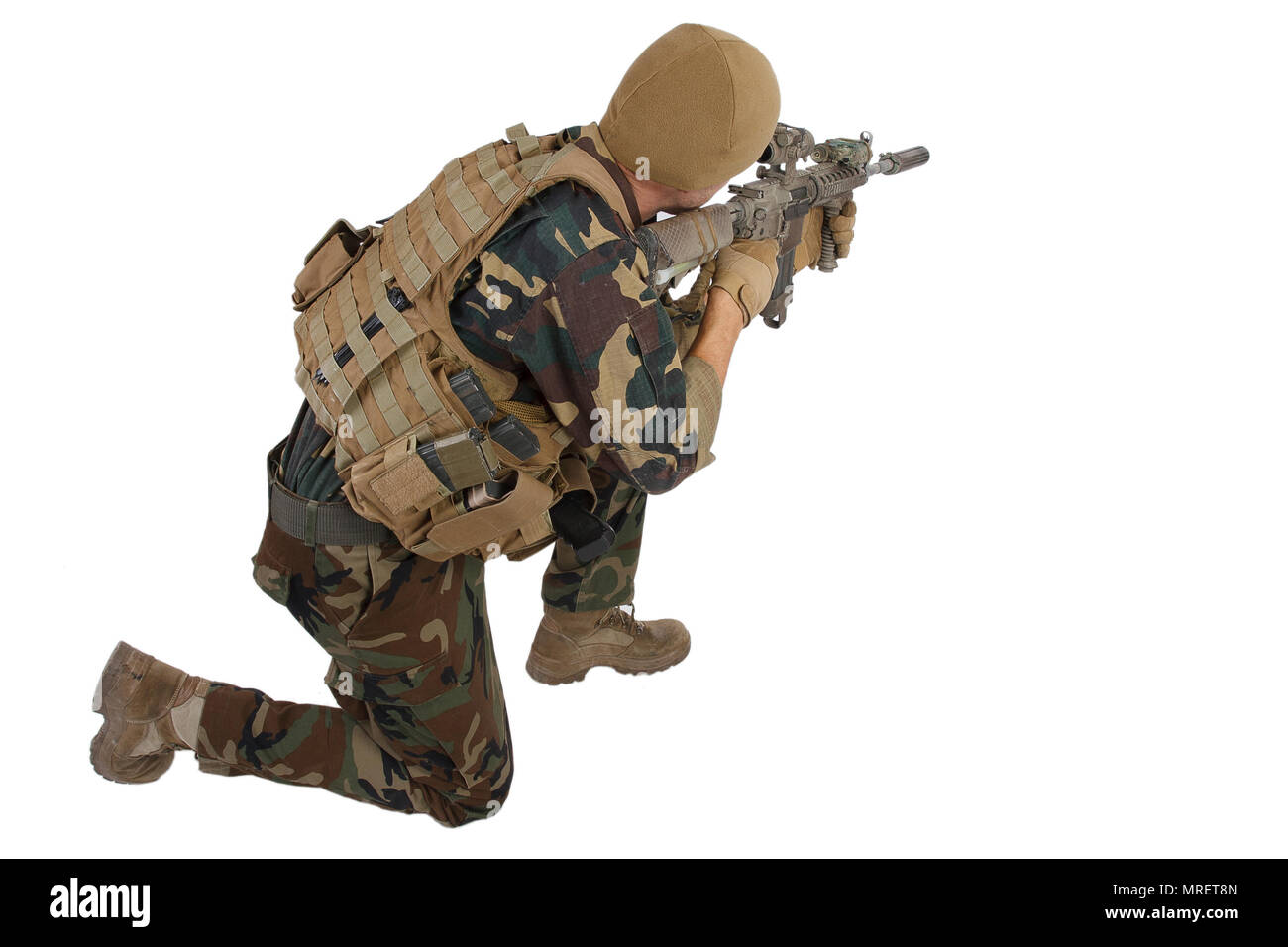 Private Military Company operator with assault rifle on white ...