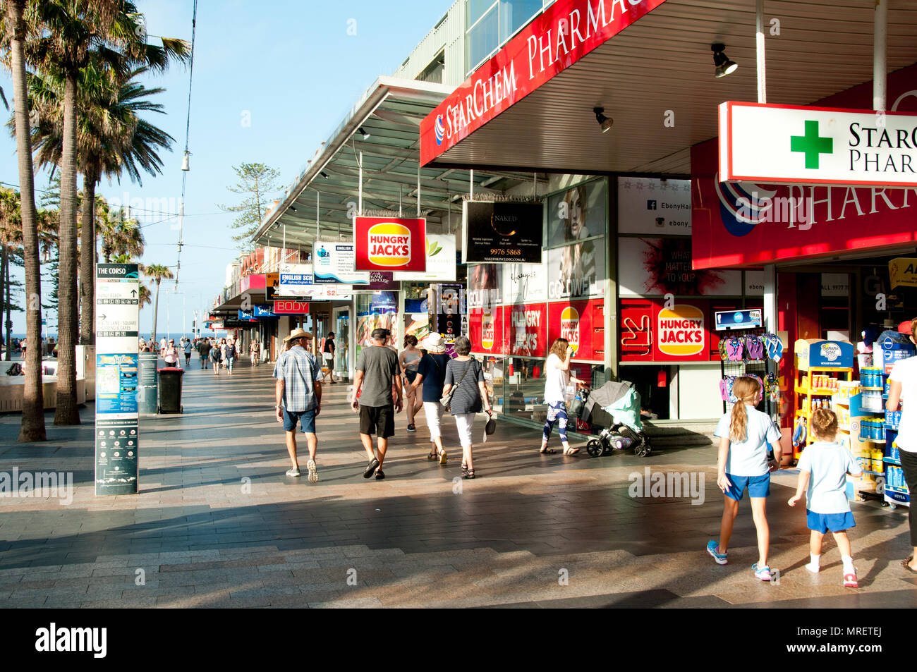 MANLY, AUSTRALIA - April 6, 2018: Pedestrians and shops on the popular ...