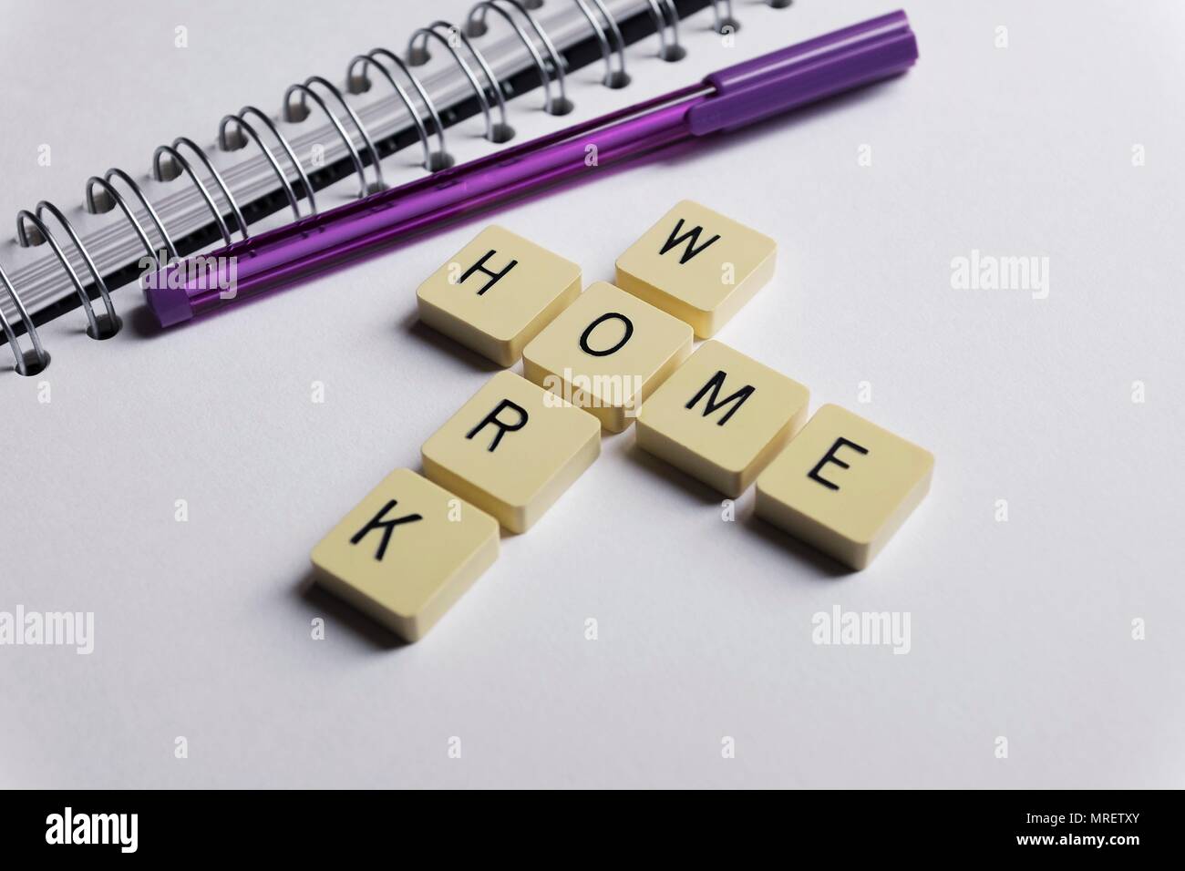 Tiles with letters spelling the words home and work Stock Photo - Alamy
