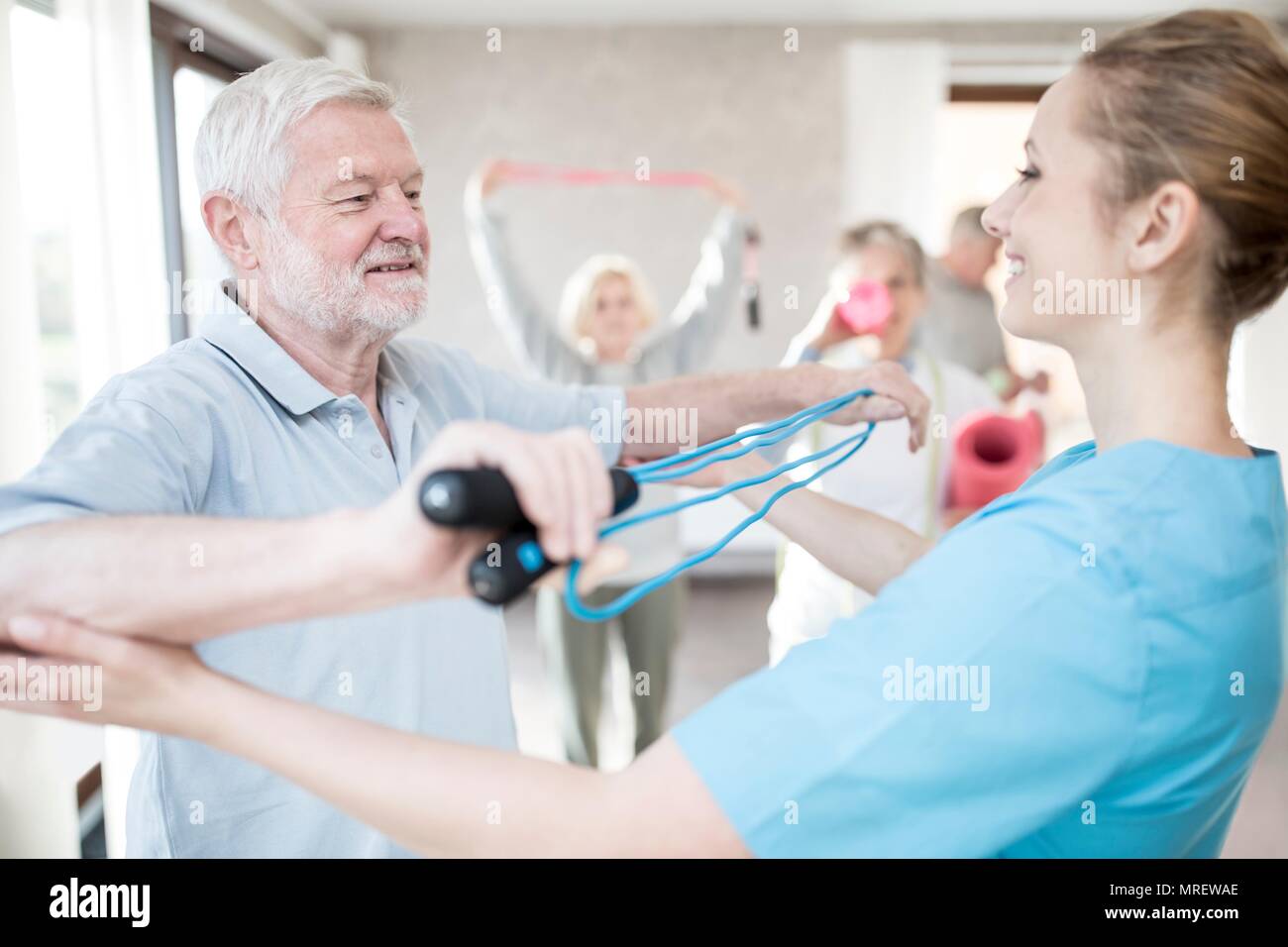 Resistance band man exercise hi-res stock photography and images - Alamy