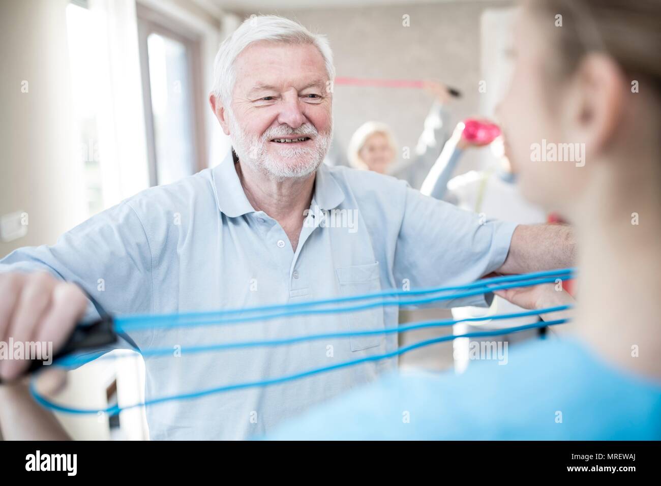 Resistance band man exercise hi-res stock photography and images - Alamy