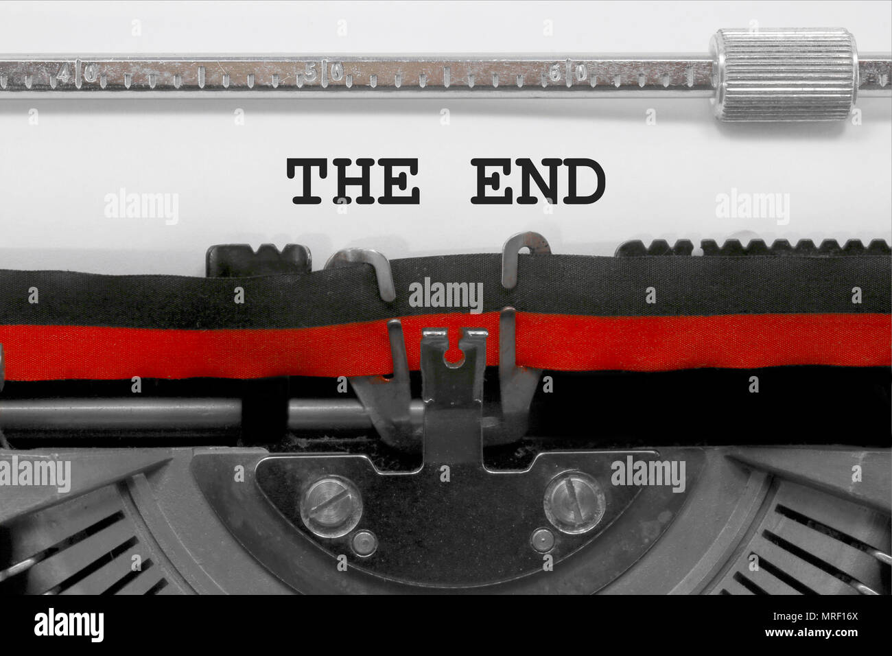 THE END text written by an old typewriter on white sheet Stock Photo ...