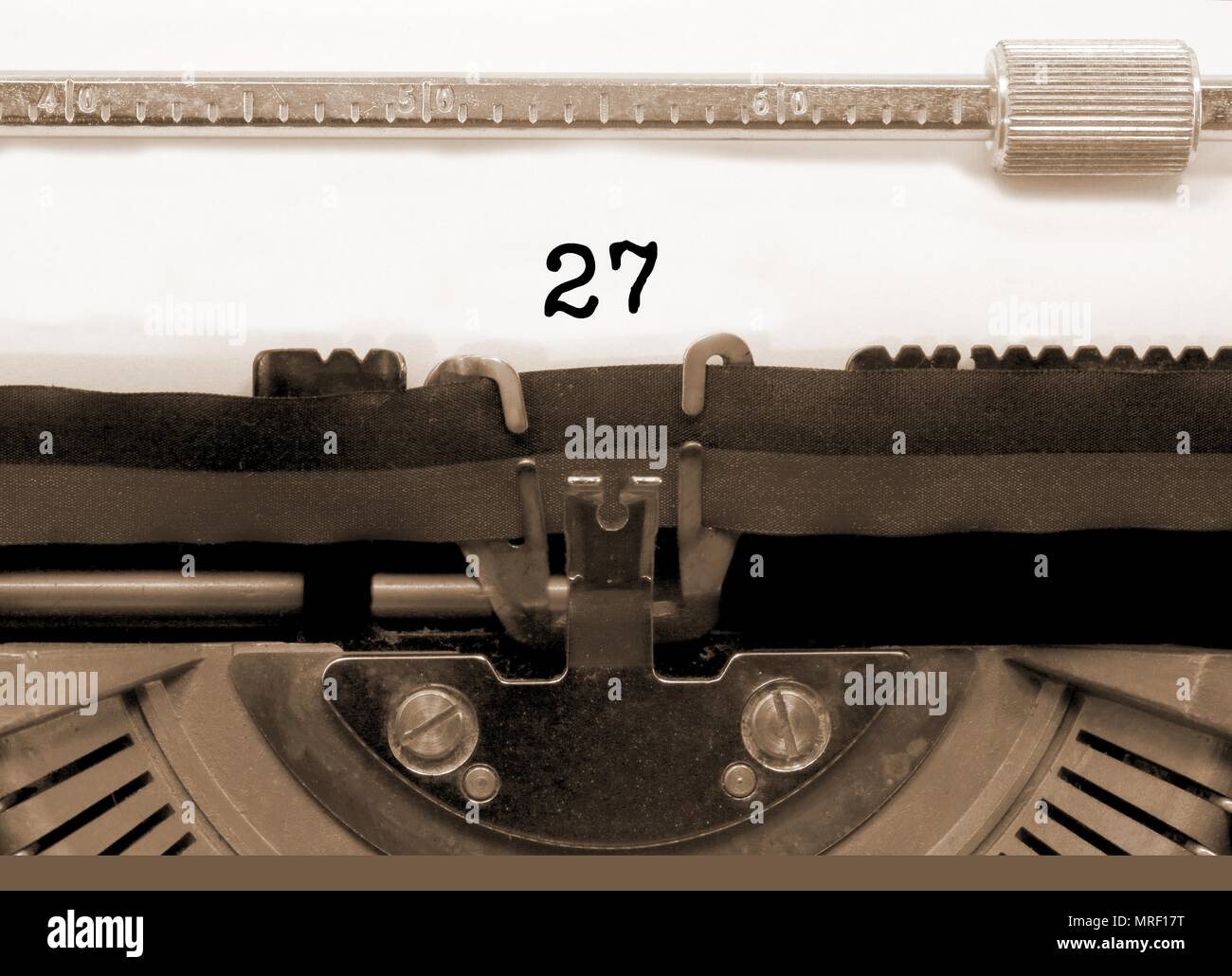 27 Number text written by an old typewriter on white sheet Stock Photo ...