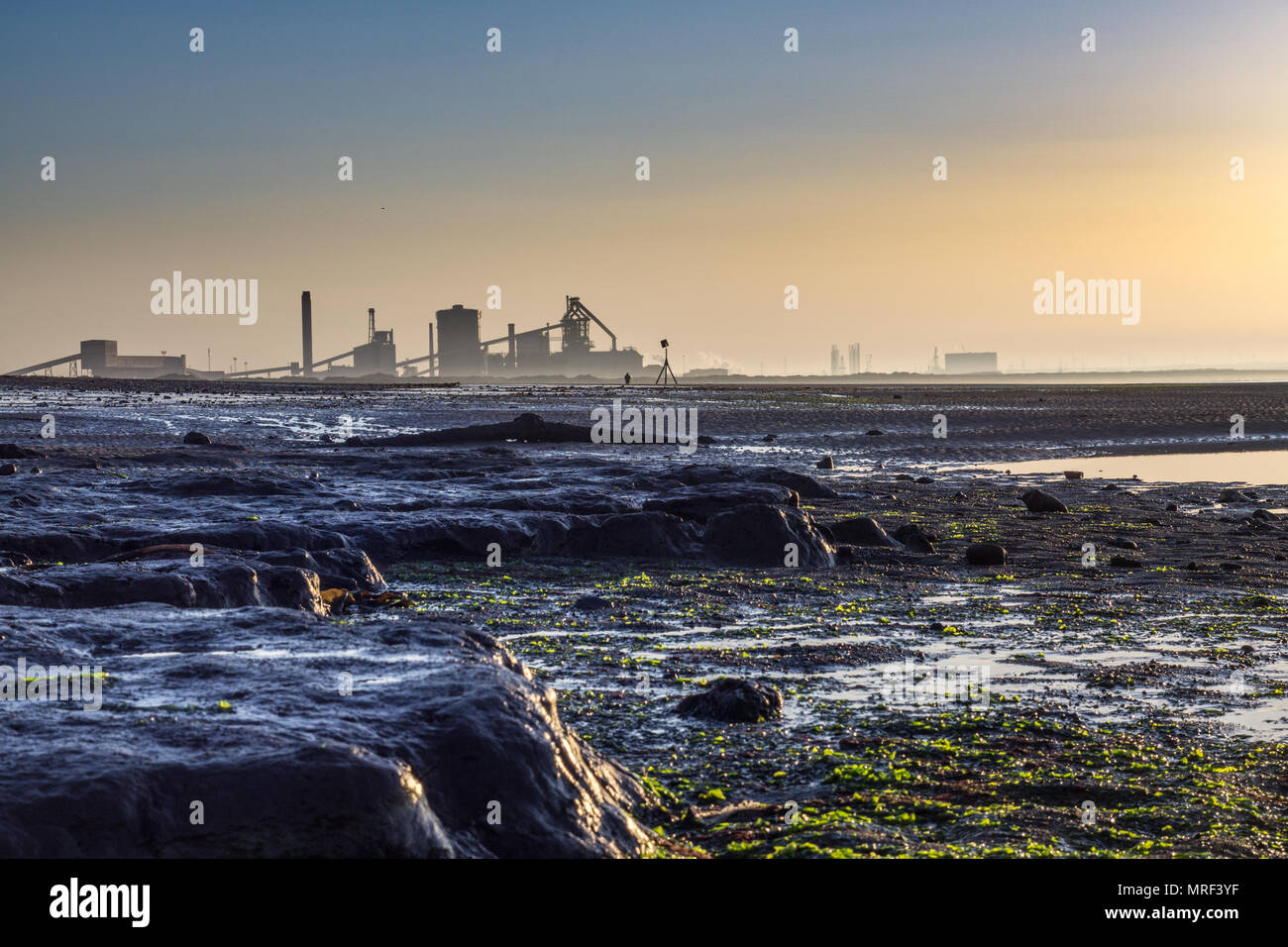 Redcar beach with industrial background at sunset Stock Photo - Alamy