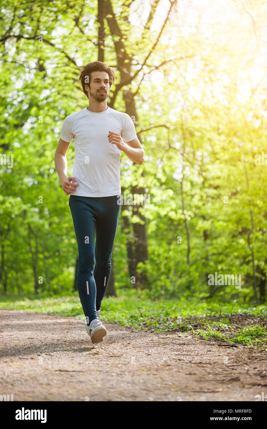 People jogging on track park hi-res stock photography and images - Alamy