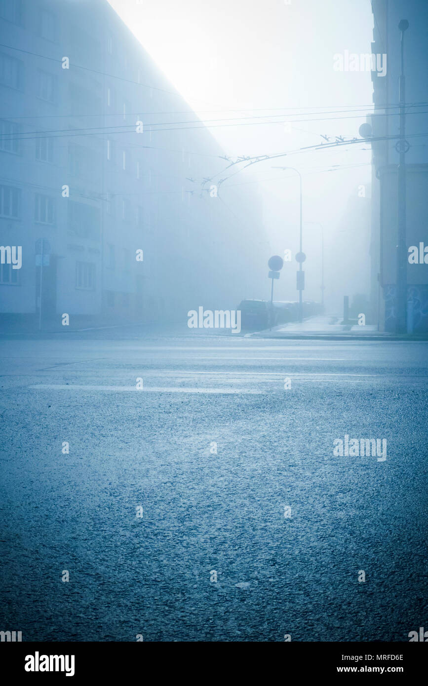 empty city streets in a winter morning with fog, no people around Stock ...