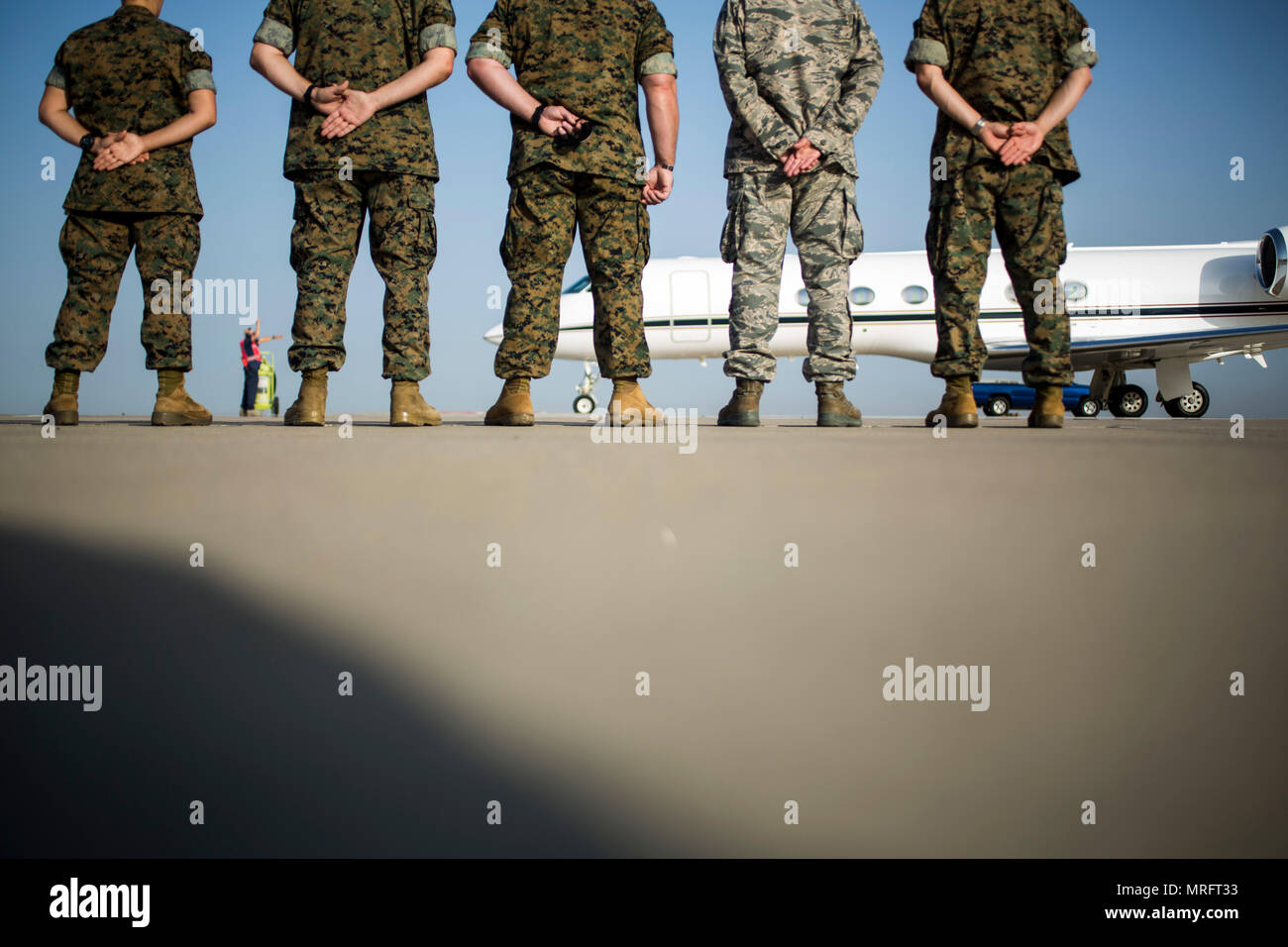 From left to right, 1st Lt. Alexandra R. Bello, public affairs officer ...
