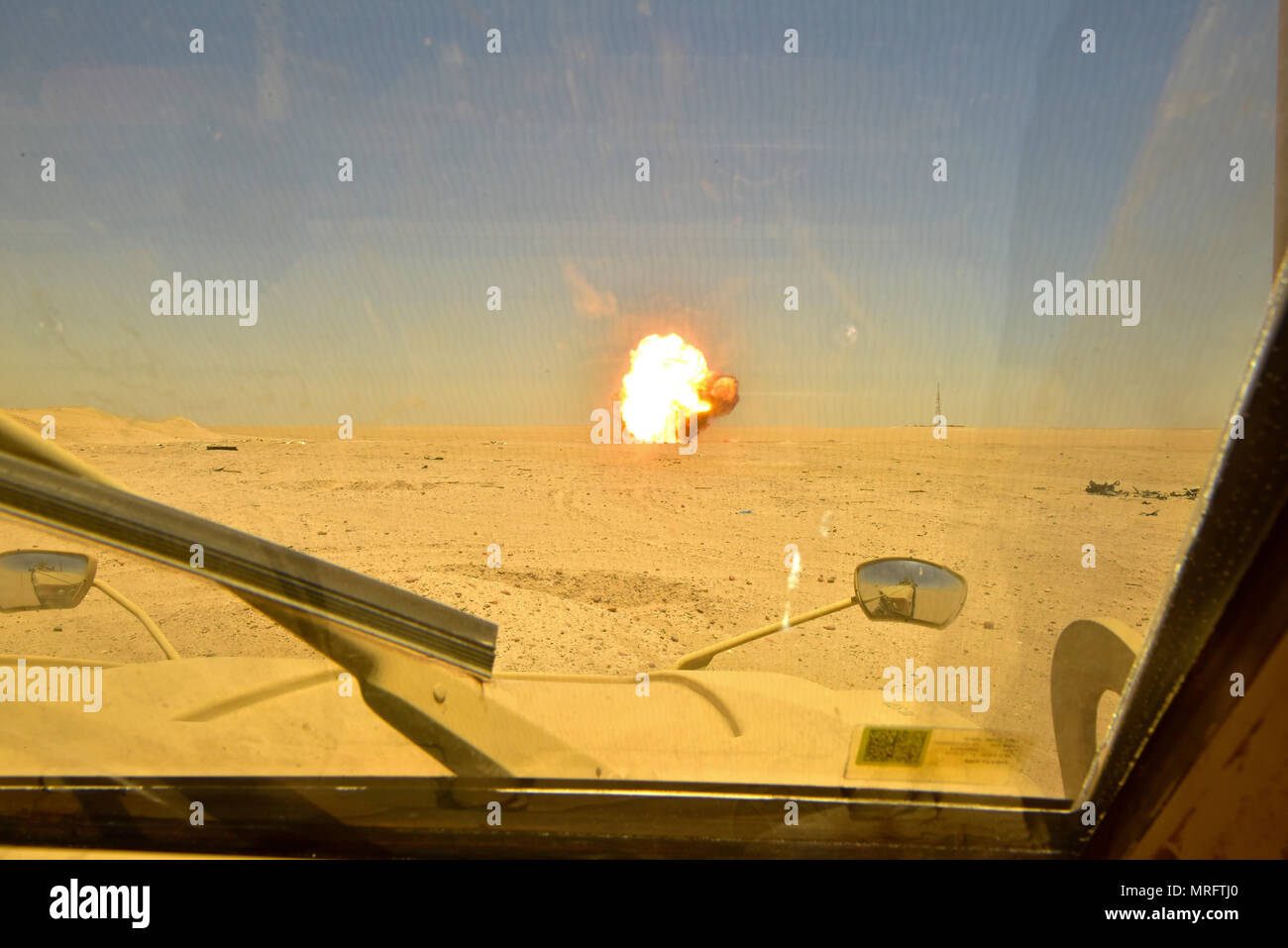 A controlled detonation blasts during a disposal operation in Southwest ...