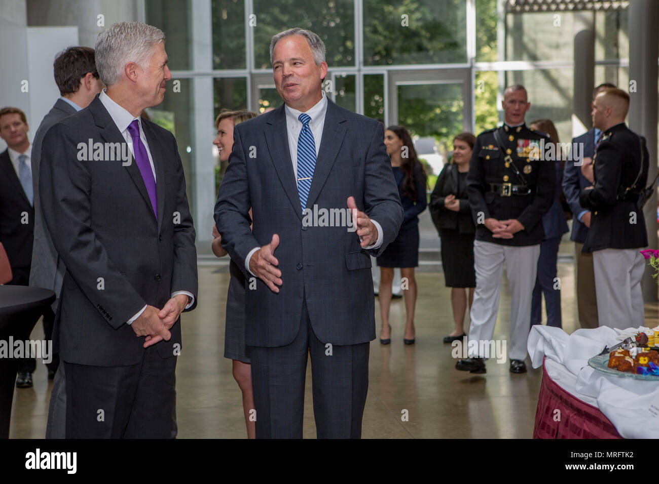 The Honorable Neil M. Gorsuch, left, associate justice of the Supreme ...