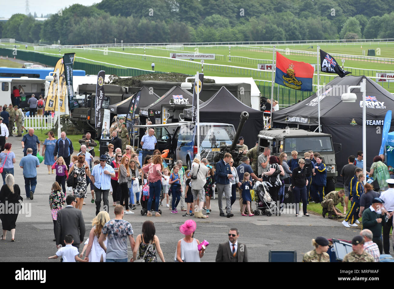 Racegoers visit the Military Village at Haydock Park Racecourse Stock ...