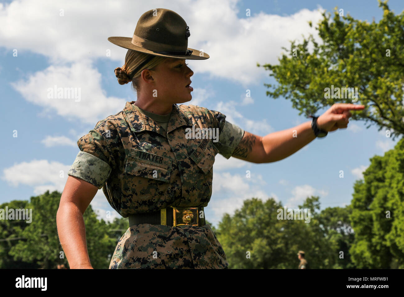 Senior Drill Instructor Sgt. Sara R. Thayer corrects future Marines ...
